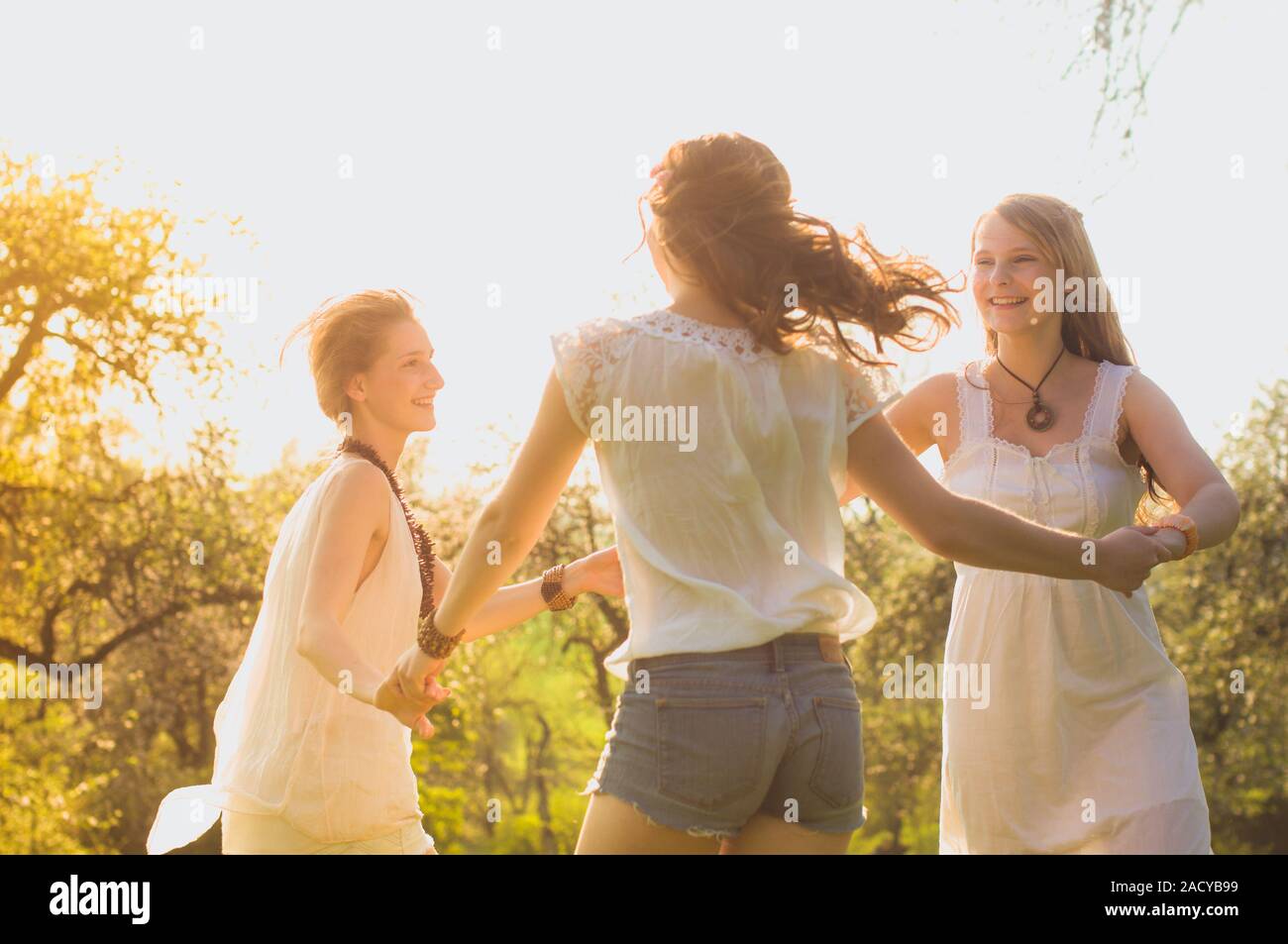 Girls dancing in the cherry orchard Stock Photo - Alamy