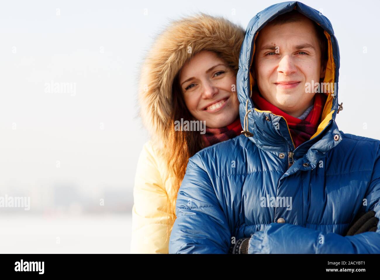 Affectionate couple laughing together outdoors hi-res stock photography ...