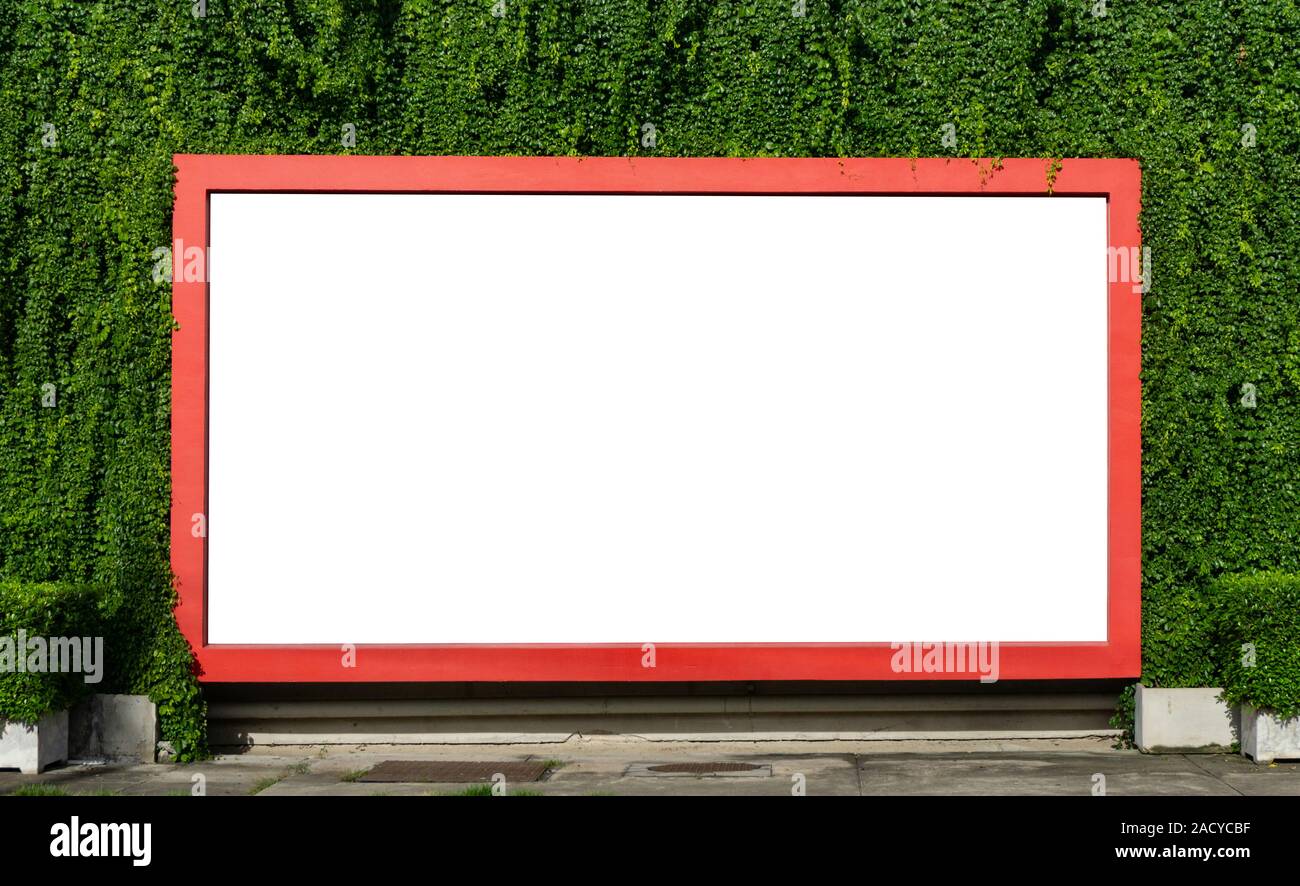 Red billboard on spring summer green leaves background Stock Photo - Alamy