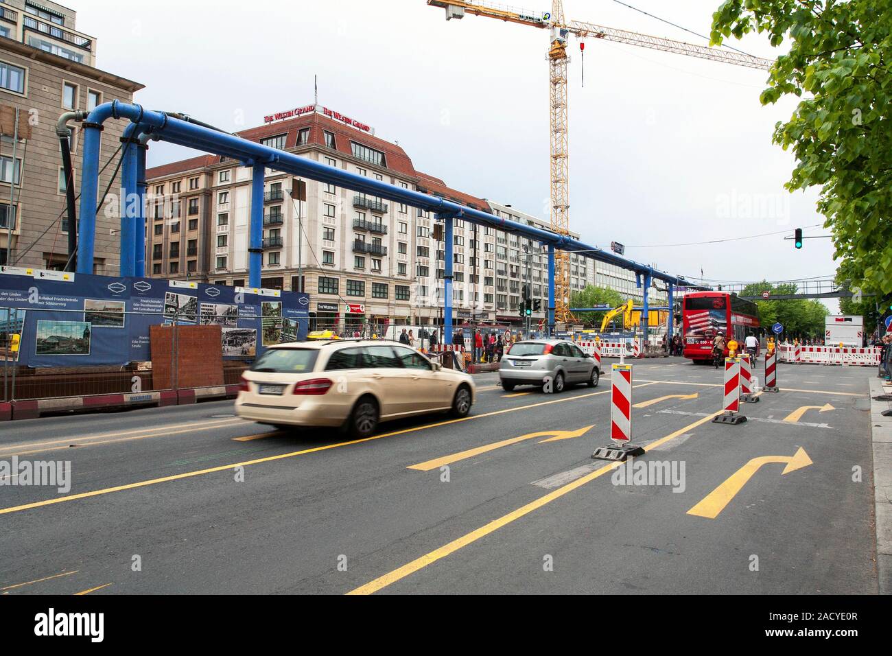 Underground station construction. Large construction pipes and traffic ...