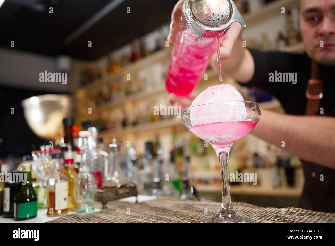 Bartender mixing cocktail drink in hi-res stock photography and images - Alamy
