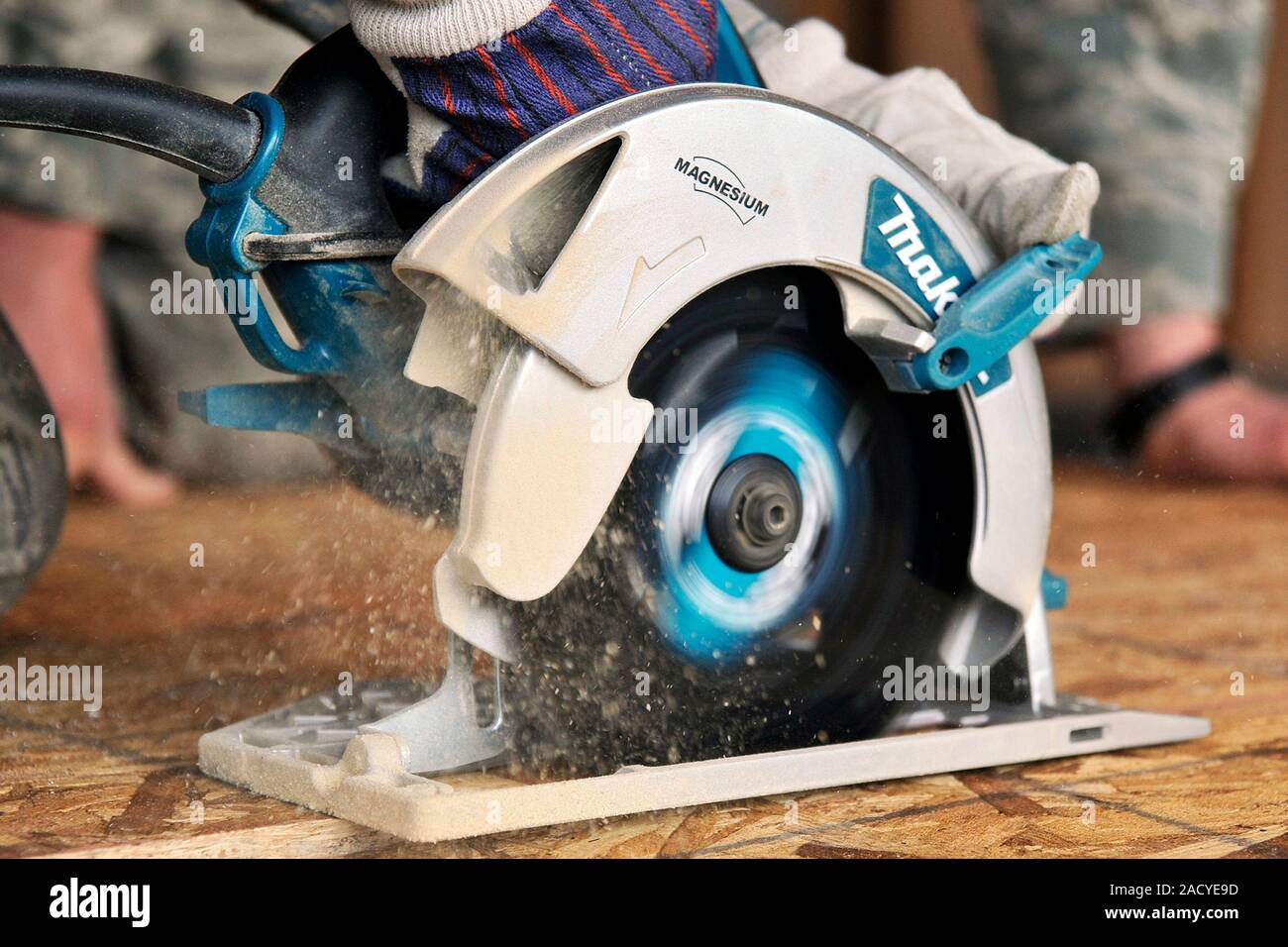 Circular saw cutting board Stock Photo - Alamy