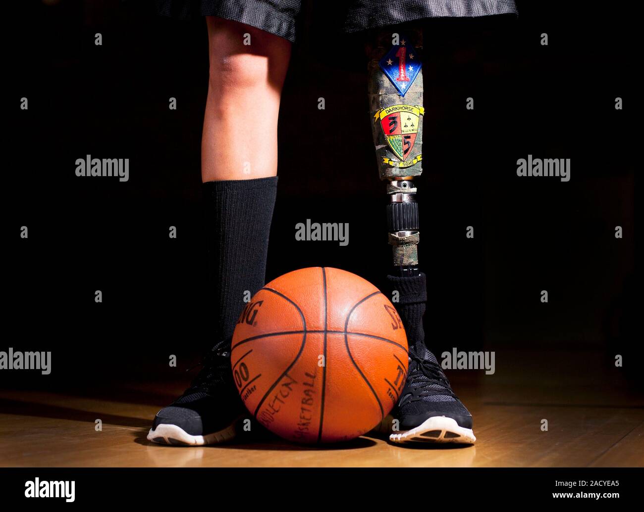 Amputee basketball athlete. The athlete is a US marine wounded in ...