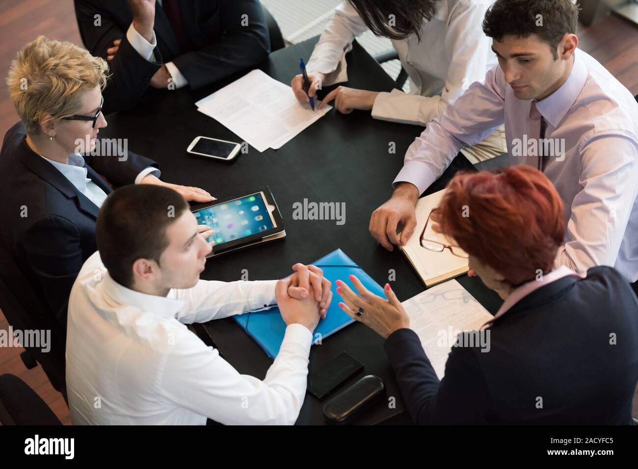 Business people group on meeting Stock Photo - Alamy