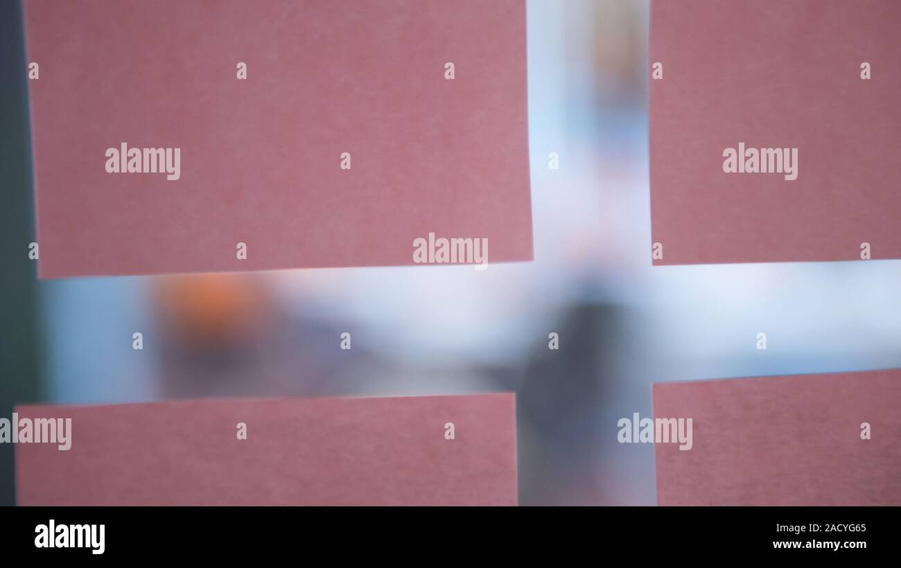 memo stickers on office wall Stock Photo - Alamy