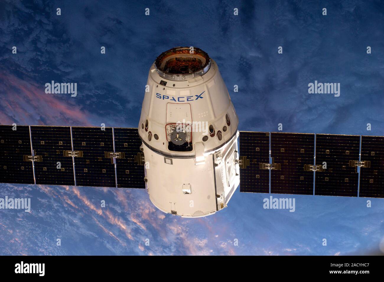 SpaceX Dragon capsule at the ISS. View from the International Space ...