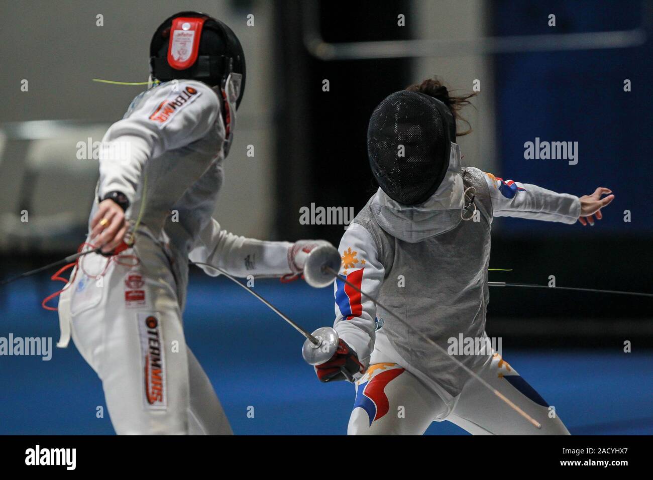 Pasay City, Philippines. 03rd Dec, 2019. Maxine Esteban (R) of the ...