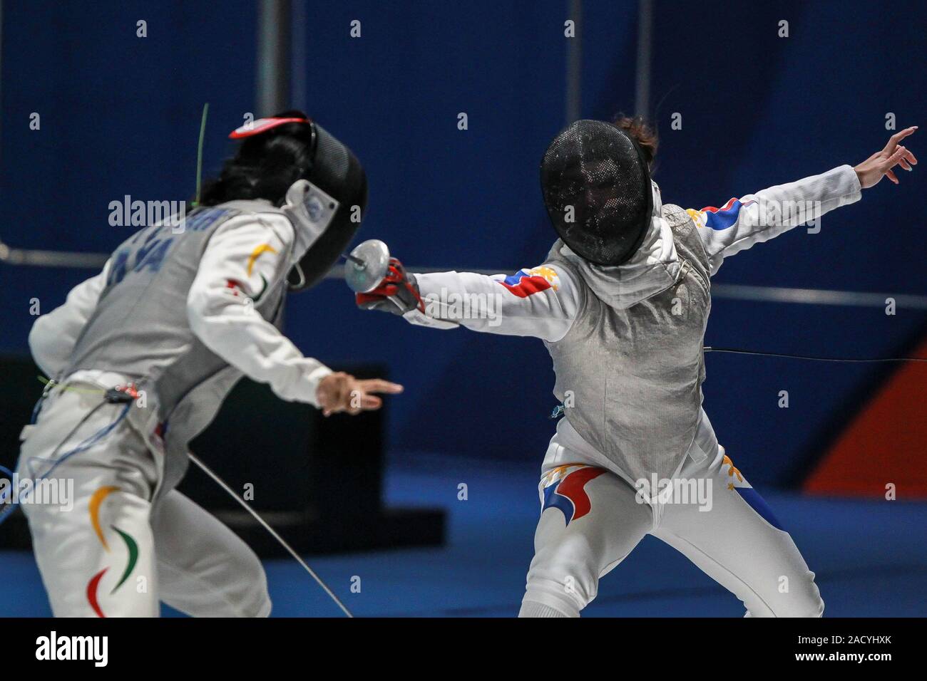 Pasay City, Philippines. 03rd Dec, 2019. Maxine Esteban (R) of the ...