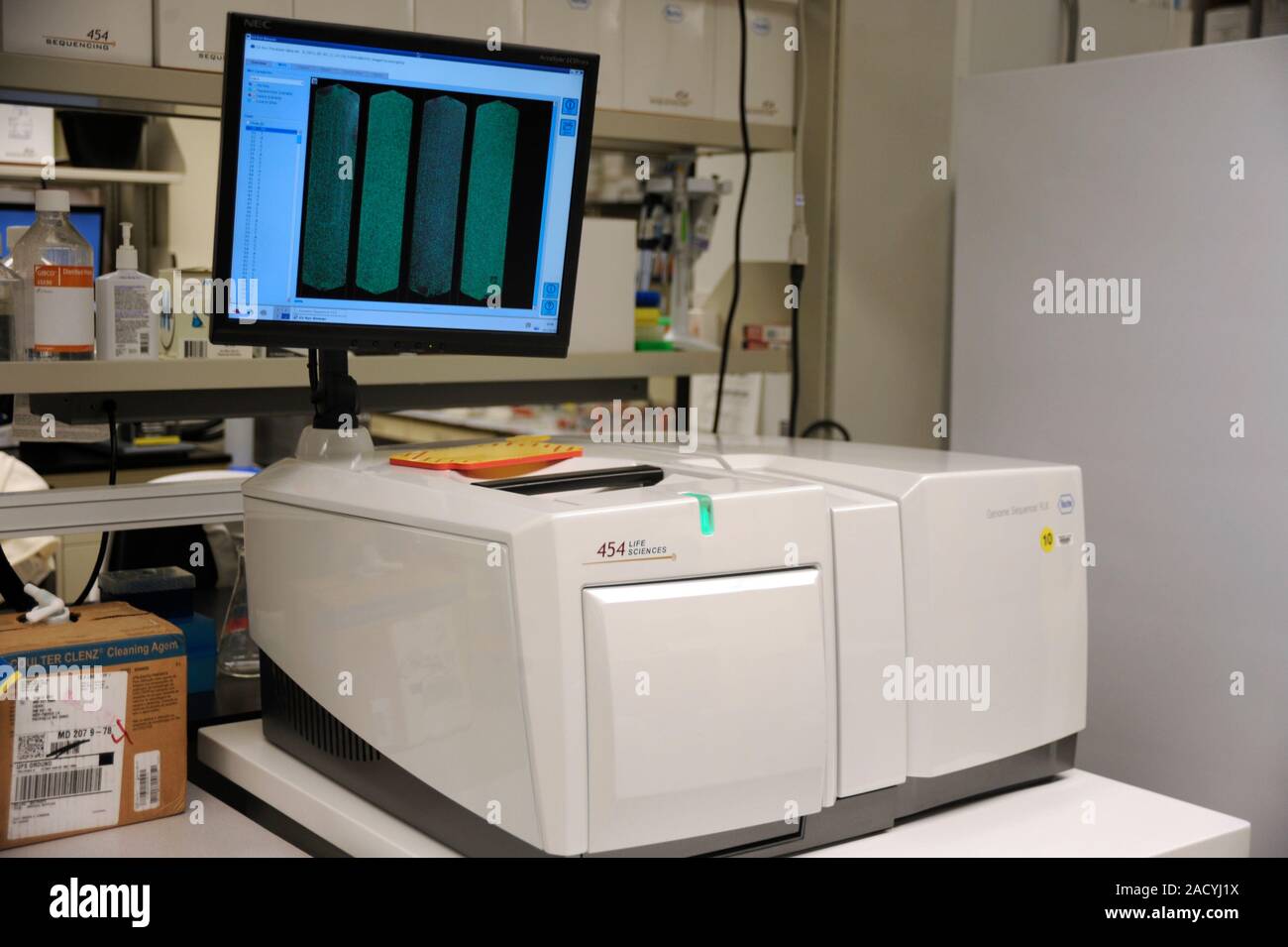 Gene sequencer in a laboratory. Gene sequencing is the process of ...