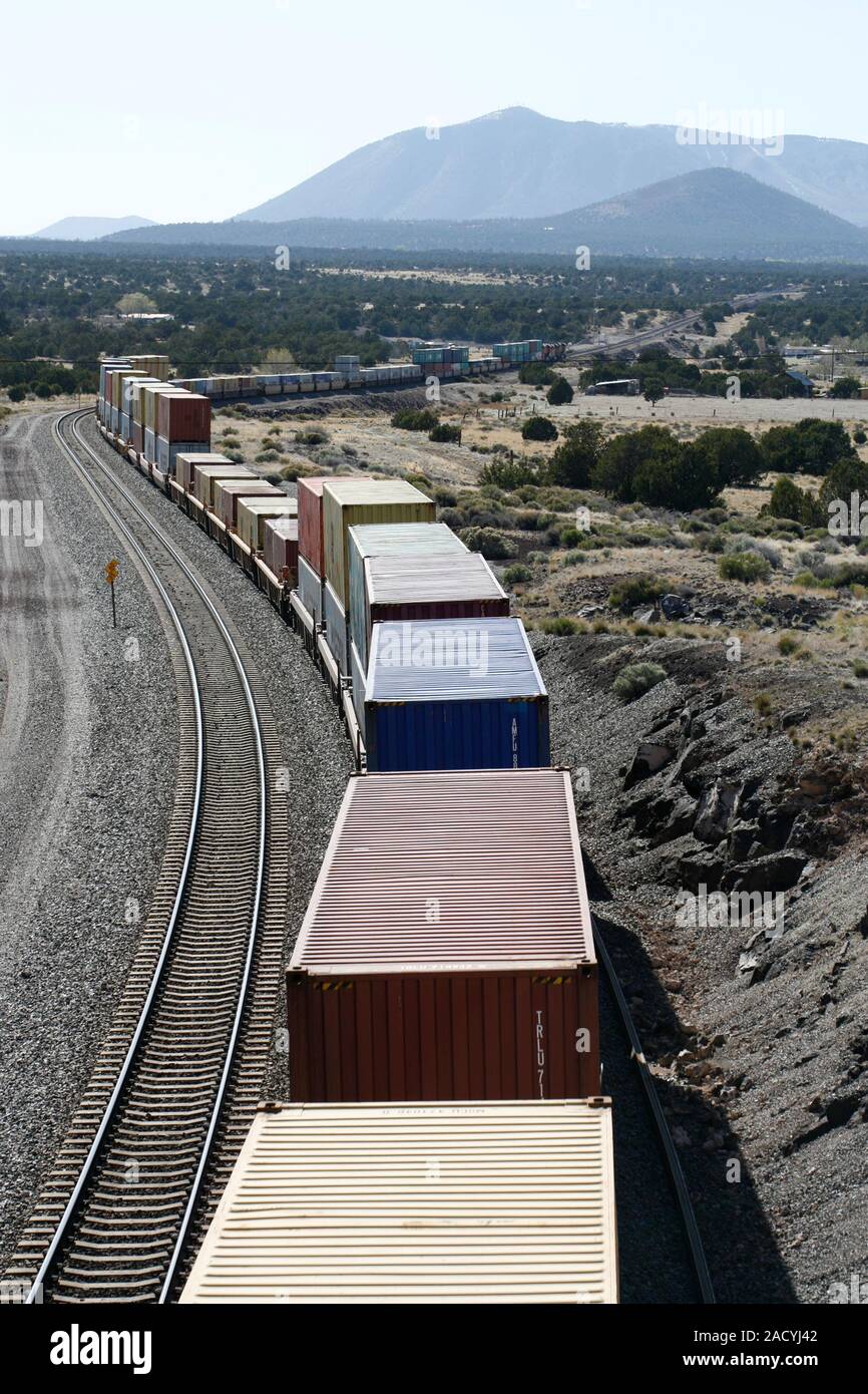 Freight train carrying cargo containers. Photographed in Arizona, USA Stock Photo - Alamy