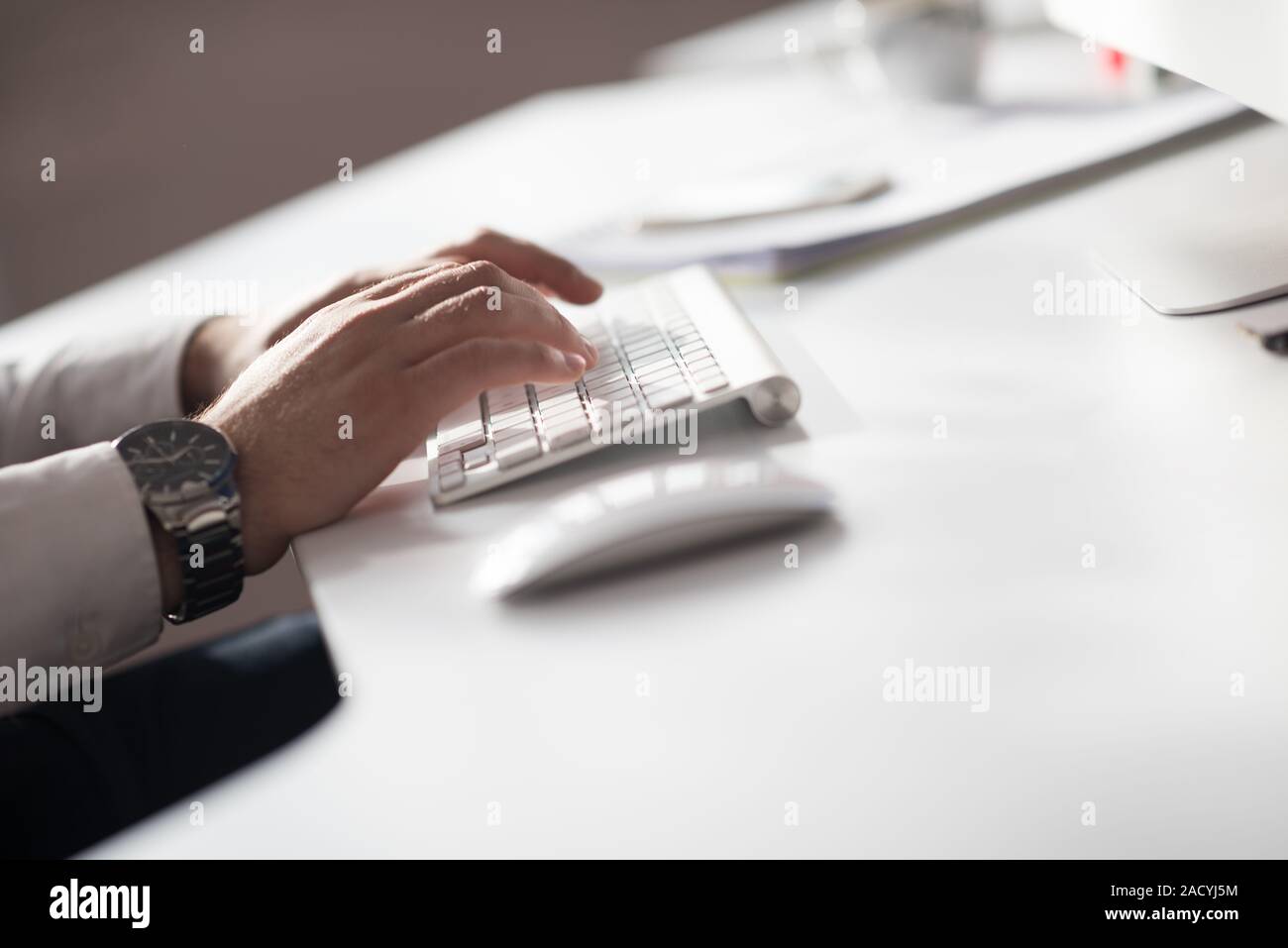 hands typing on desktop computer Stock Photo - Alamy