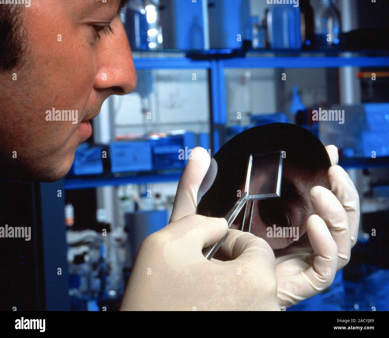 Bioscience microchips, IBM research. IBM scientist Emmanuel Delamarche ...