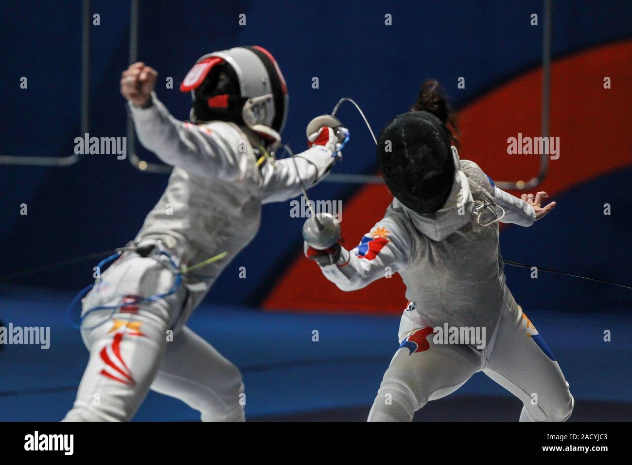 Pasay City, Philippines. 3rd Dec, 2019. Maxine Esteban (R) of the ...