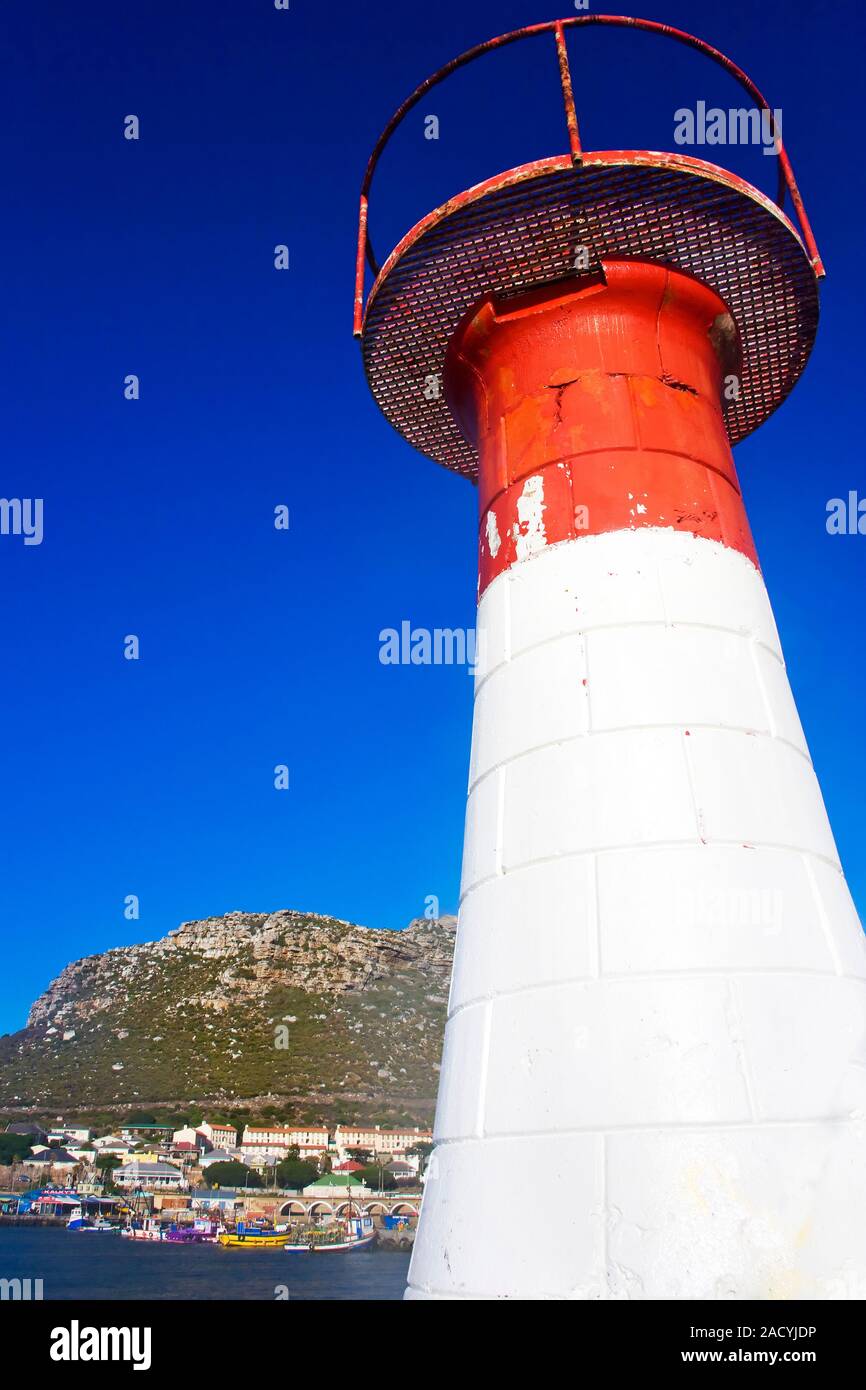Kalk Bay Harbour and lighthouse with colourful fishing boats, Cape Town ...