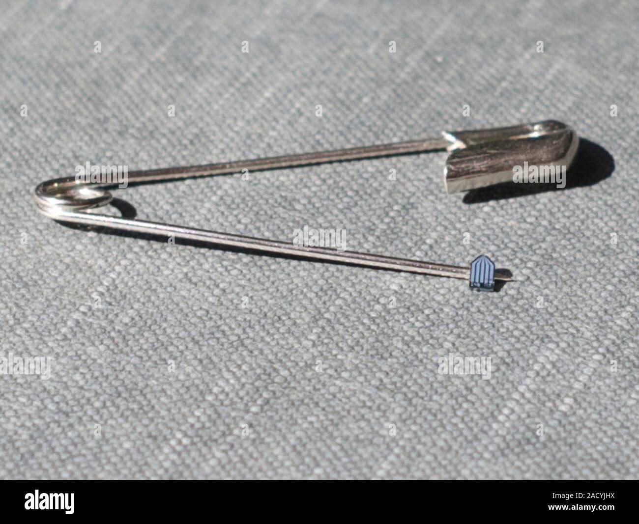 NanoFrazor lithography, SwissLitho. Safety pin and a silicon chip ...
