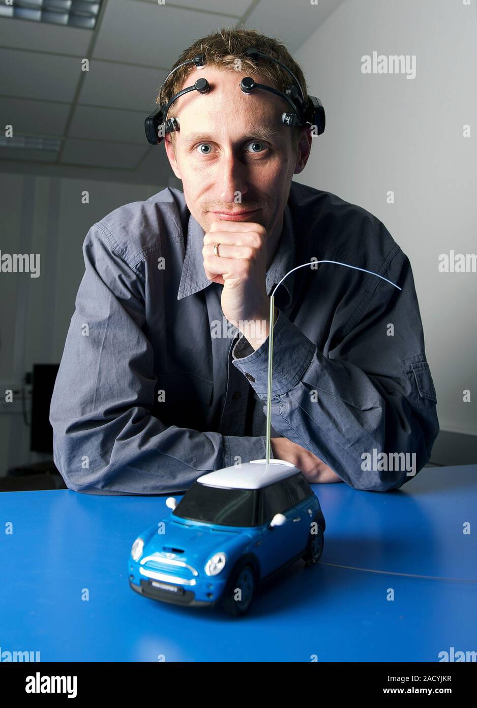 EPOC device, IBM research. IBM scientist Kevin Brown wearing the EPOC ...