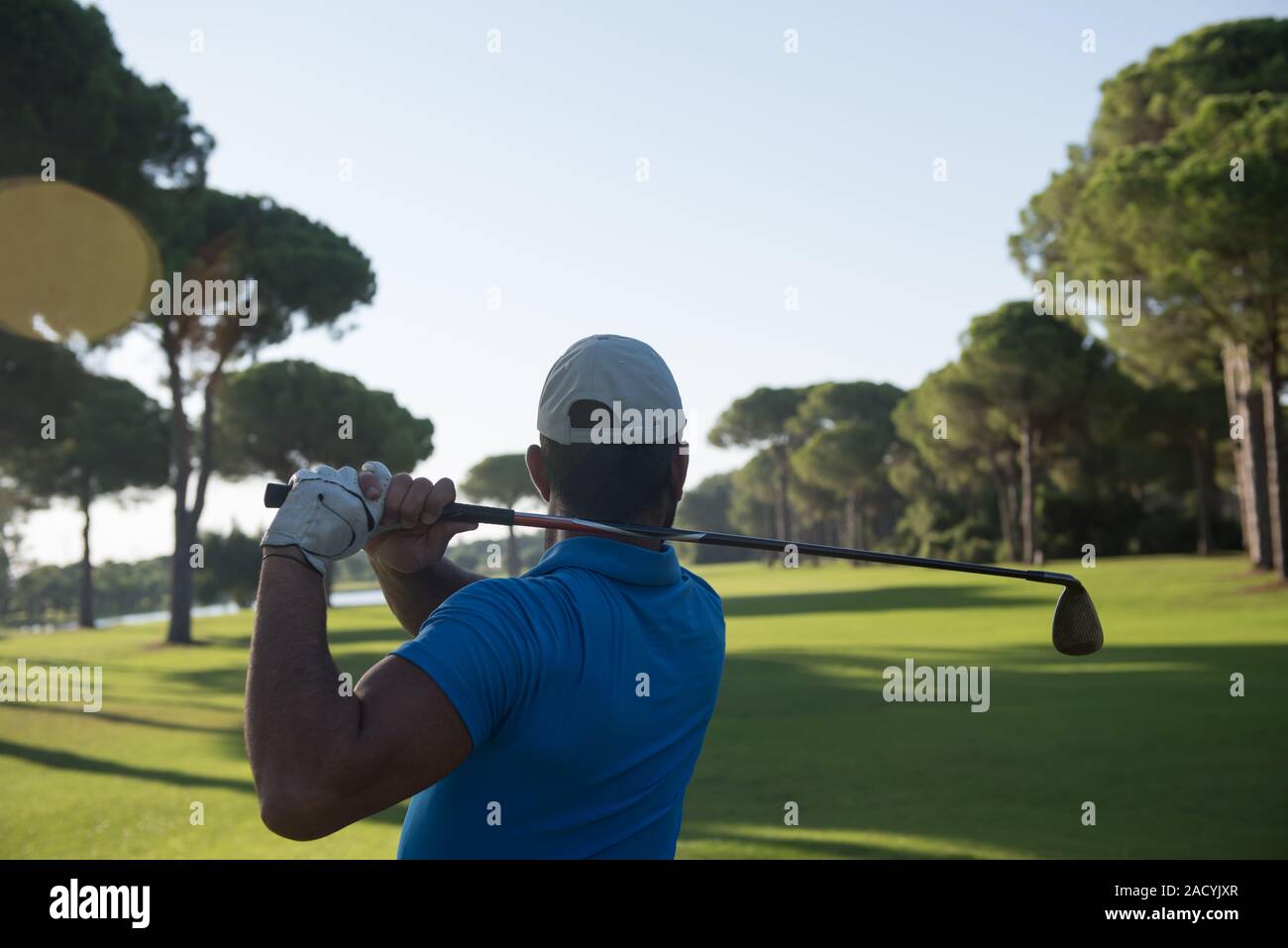 golf player hitting shot Stock Photo - Alamy