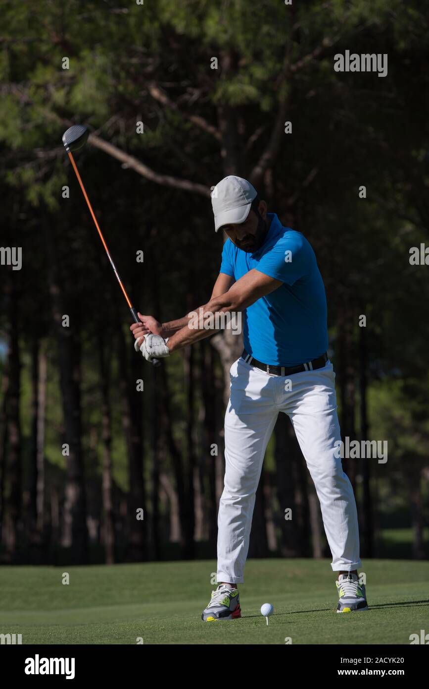 golf player hitting shot Stock Photo - Alamy