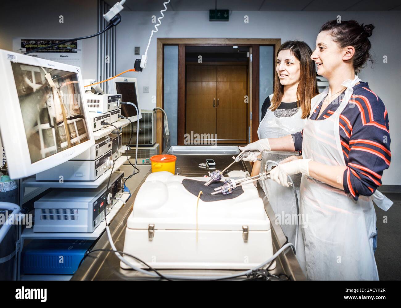 Surgical skills practice. Surgeons practising using laparoscopy ...