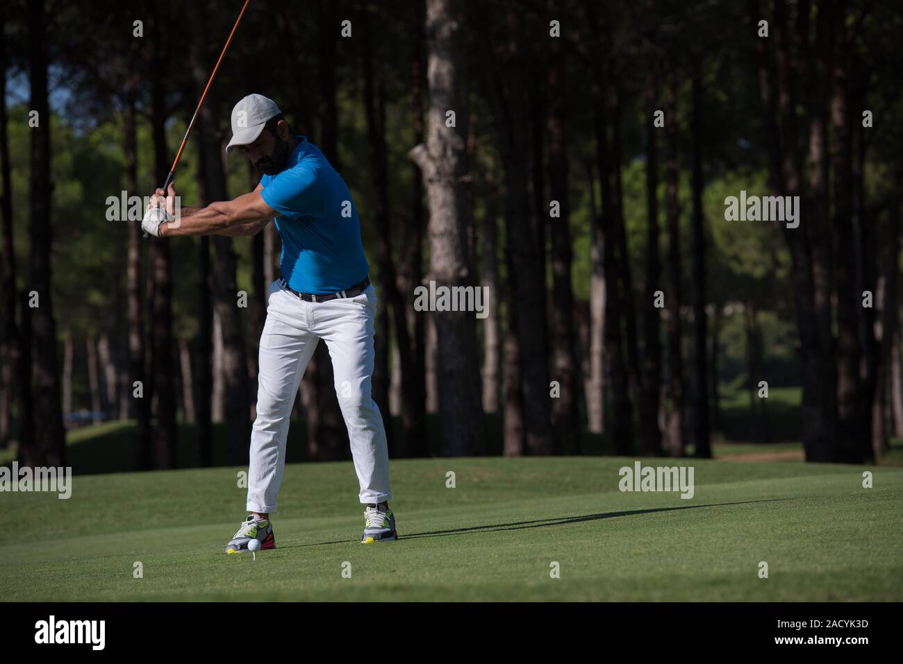 golf player hitting shot Stock Photo - Alamy