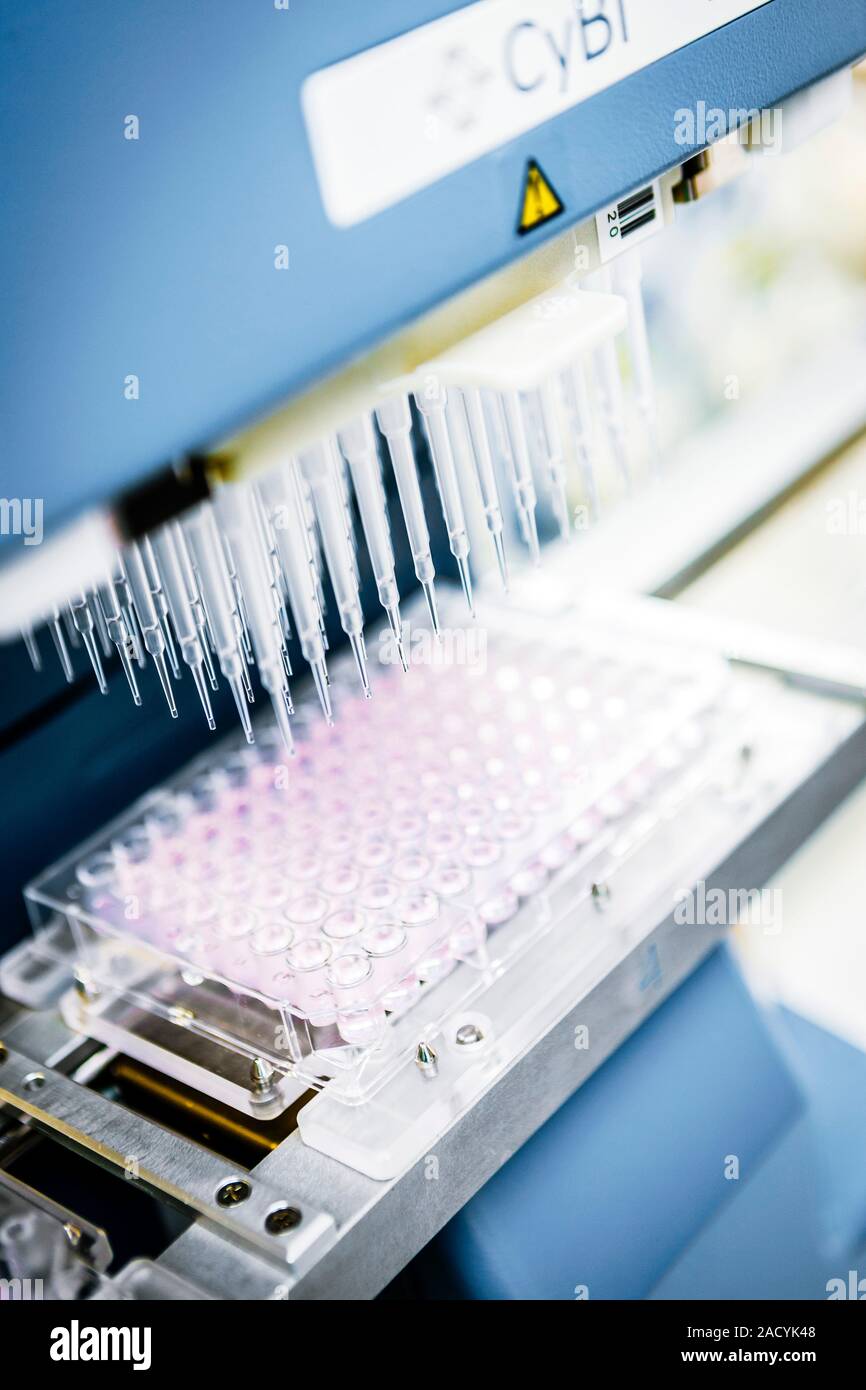 High-throughput screening machine. Close-up of the multi-well sampler ...