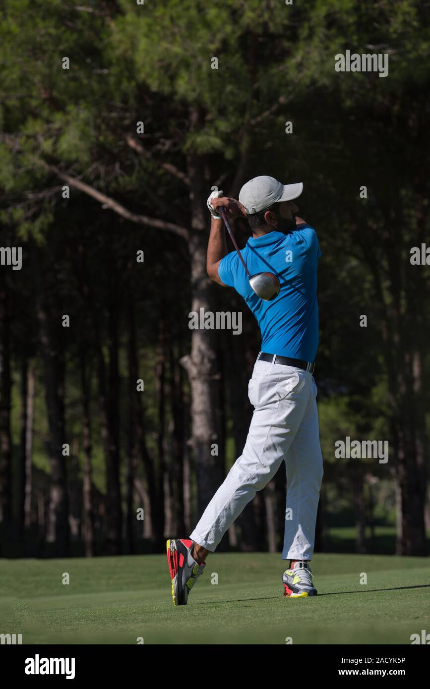 golf player hitting shot Stock Photo - Alamy