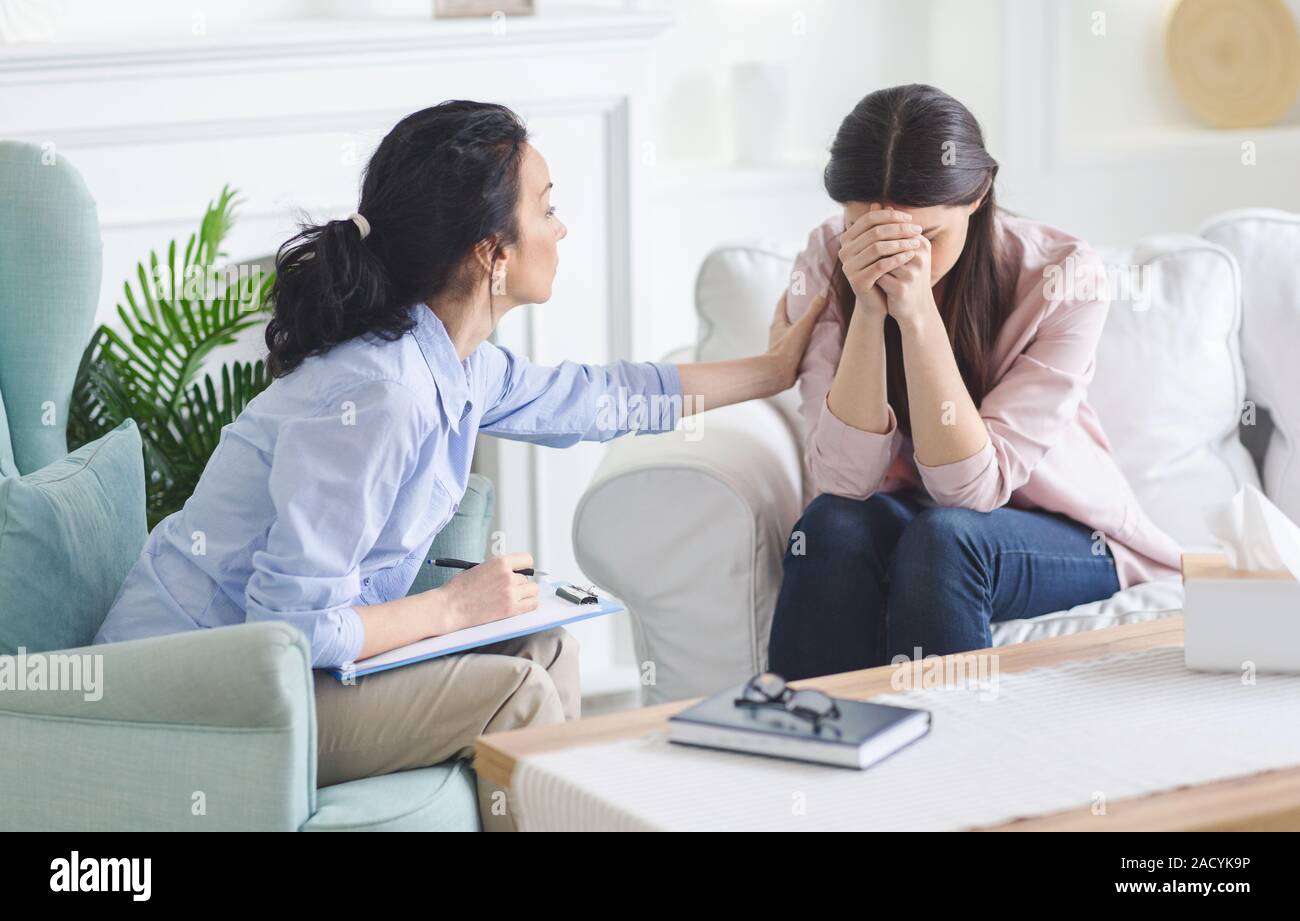 Young Upset Woman Crying At Therapist Session Sharing Her Problem