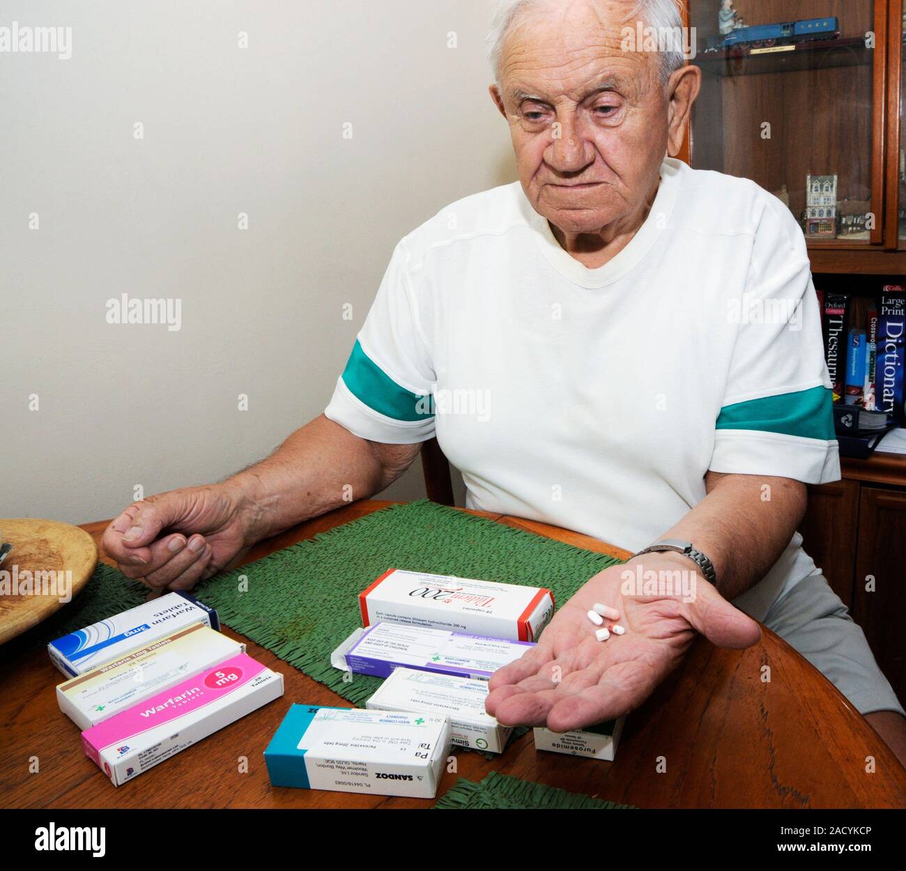 Senior man with prescription drugs Stock Photo - Alamy