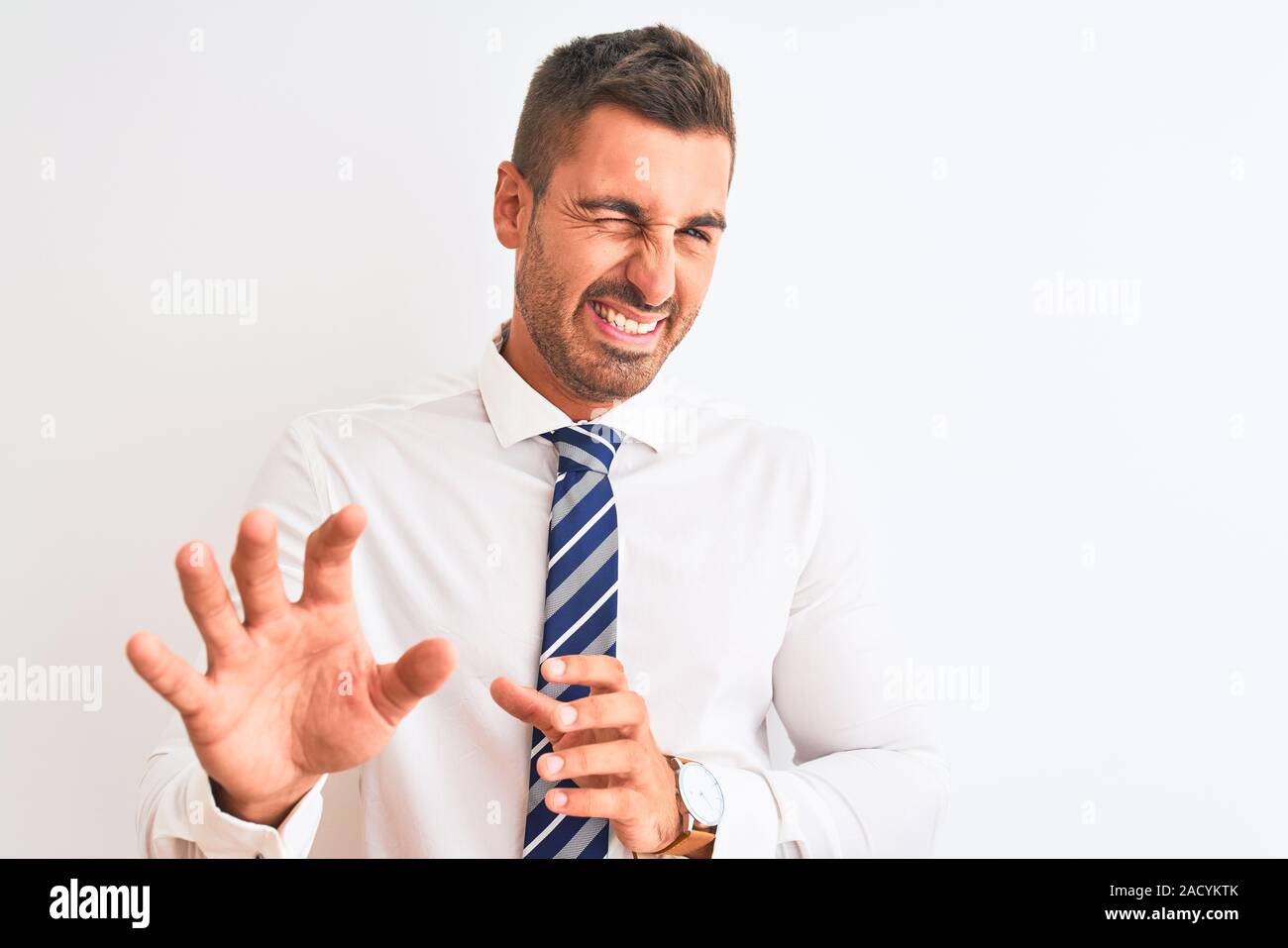 Young handsome elegant business man over isolated background disgusted ...