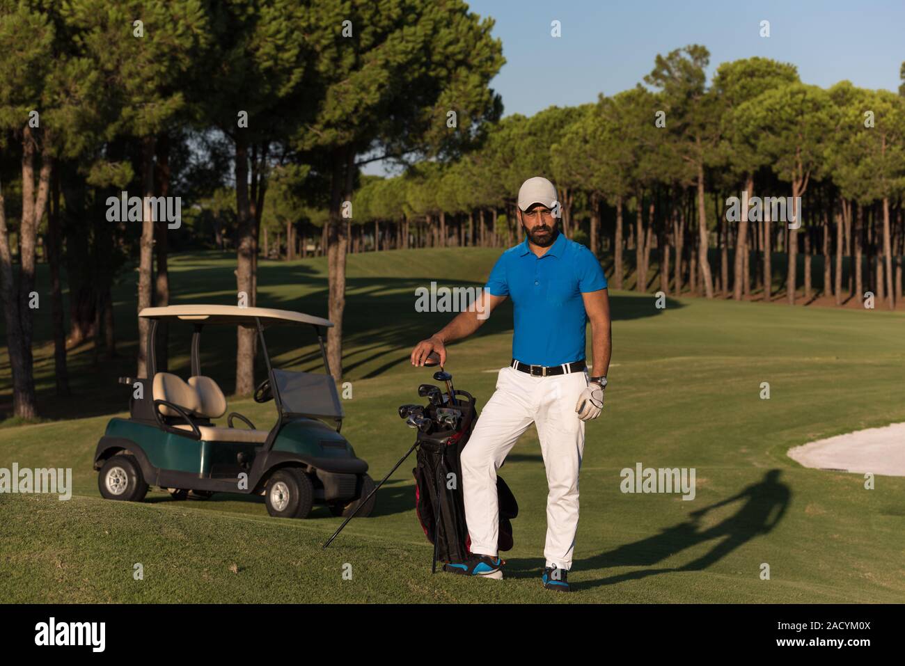golfer portrait at golf course Stock Photo - Alamy