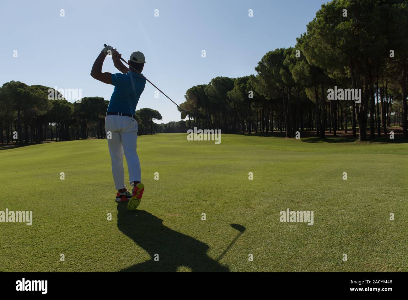 golf player hitting shot Stock Photo - Alamy