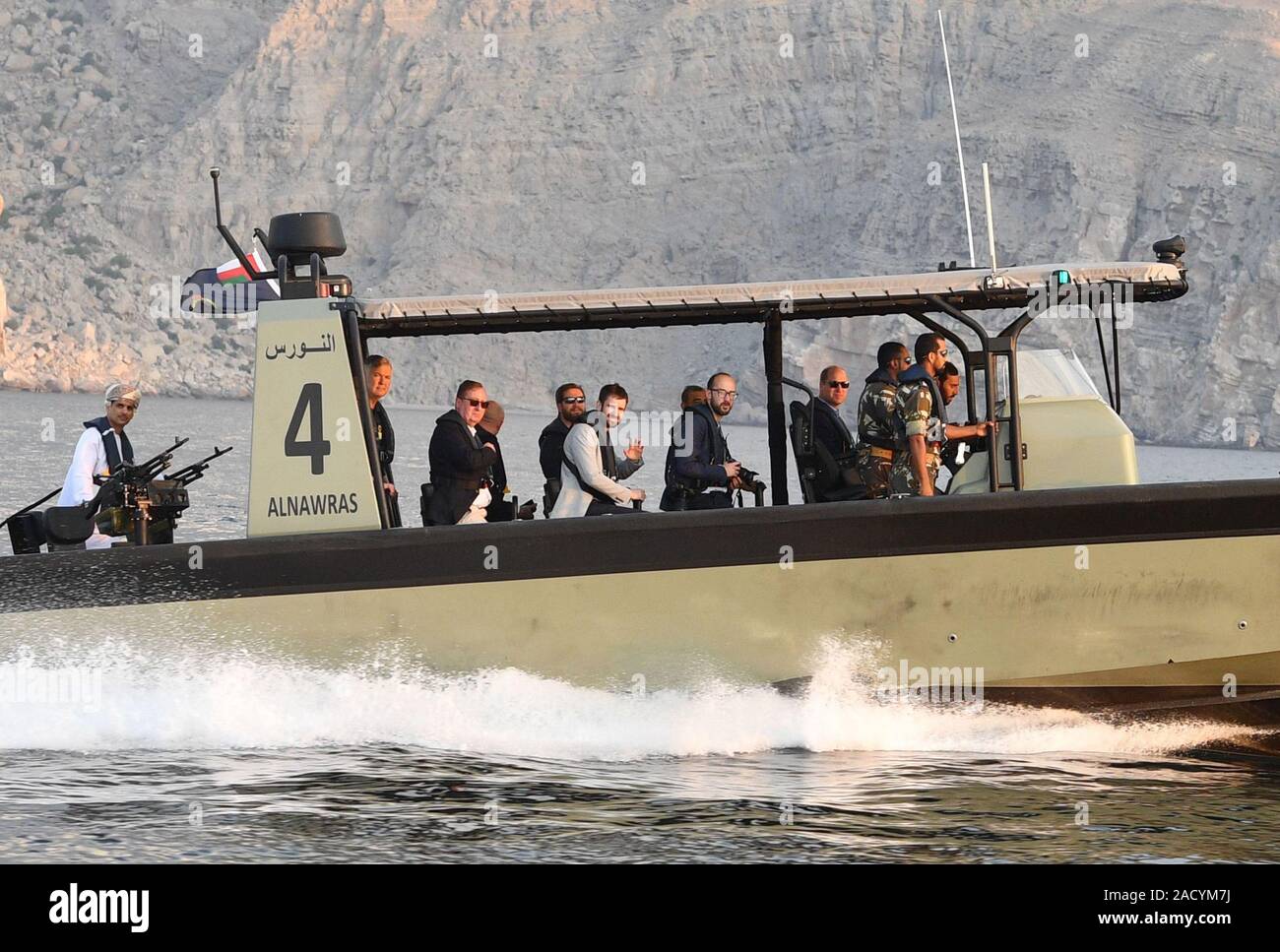 The Duke of Cambridge (seated front) on the water in a Royal Navy of ...