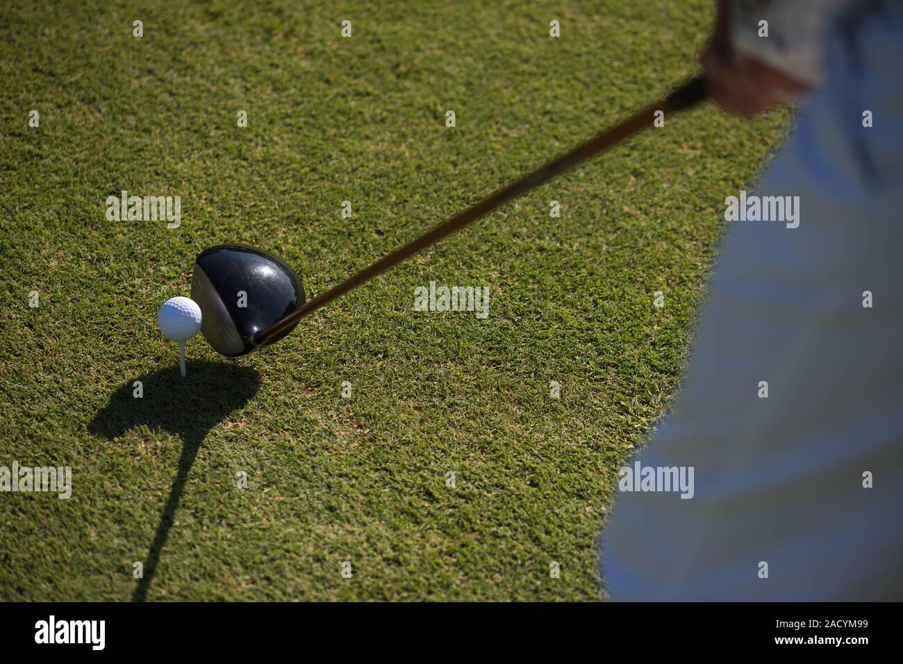 top view of golf club and ball in grass Stock Photo - Alamy