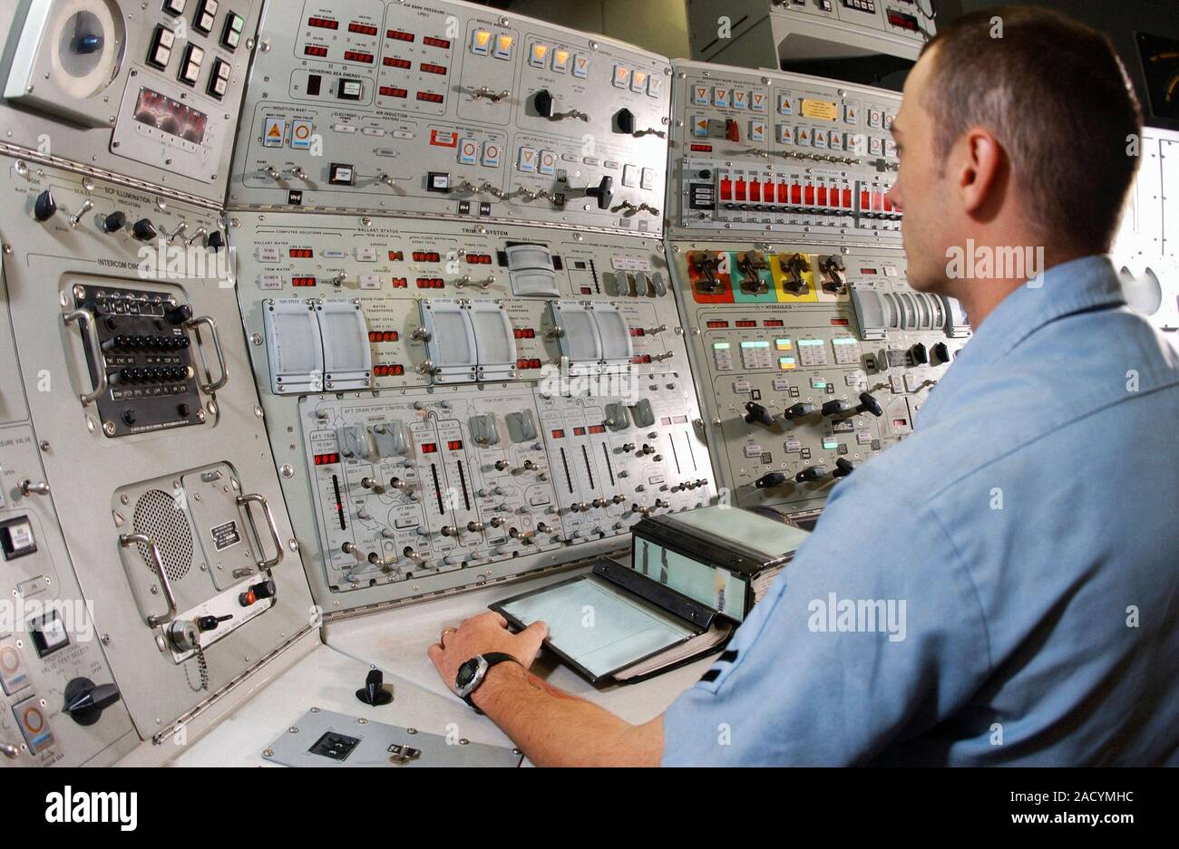 Naval simulator training. Sailor using a simulator for refresher ...