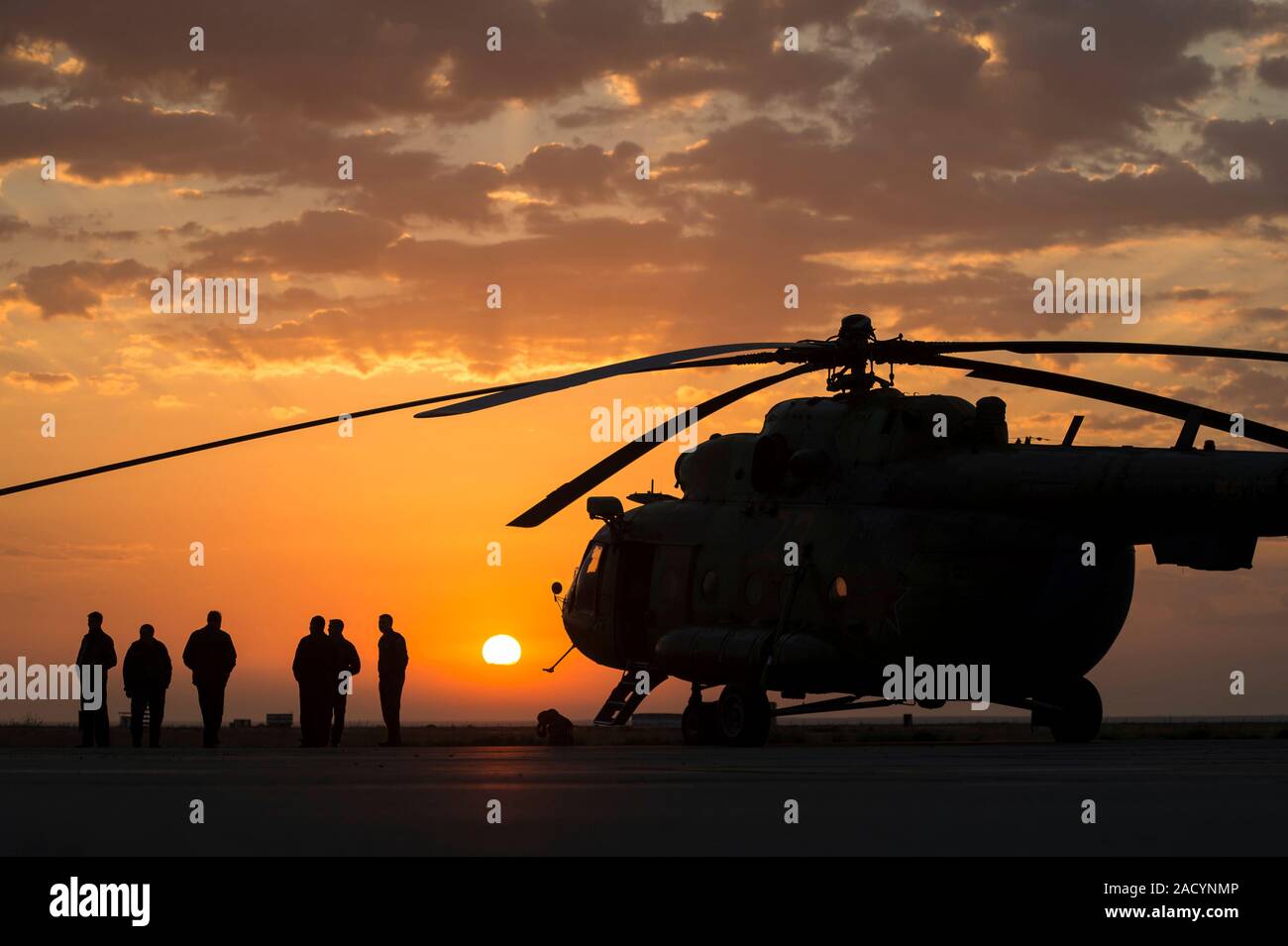 Russian search and rescue helicopter and crew. They are waiting to fly ...