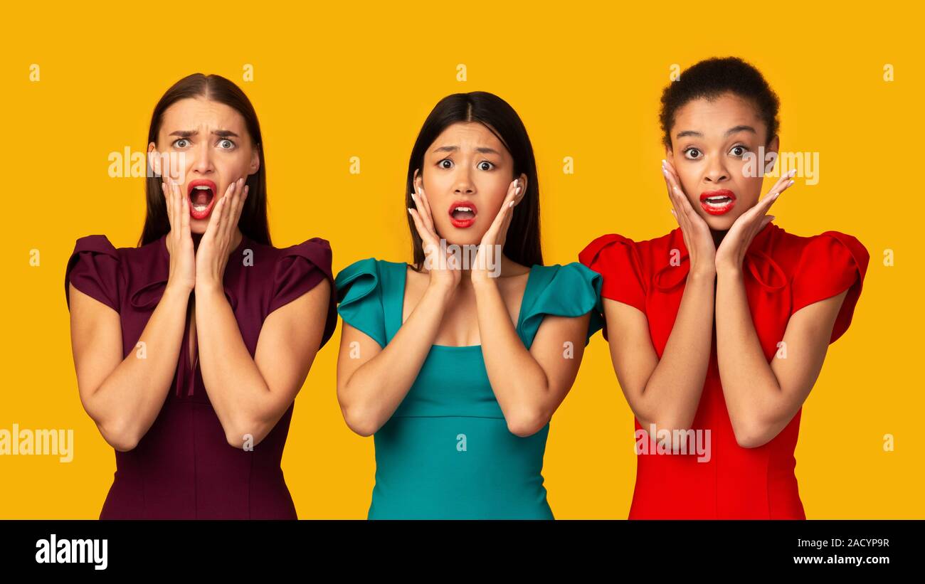 Three Discontented Girls Screaming Standing On Yellow Studio Background ...