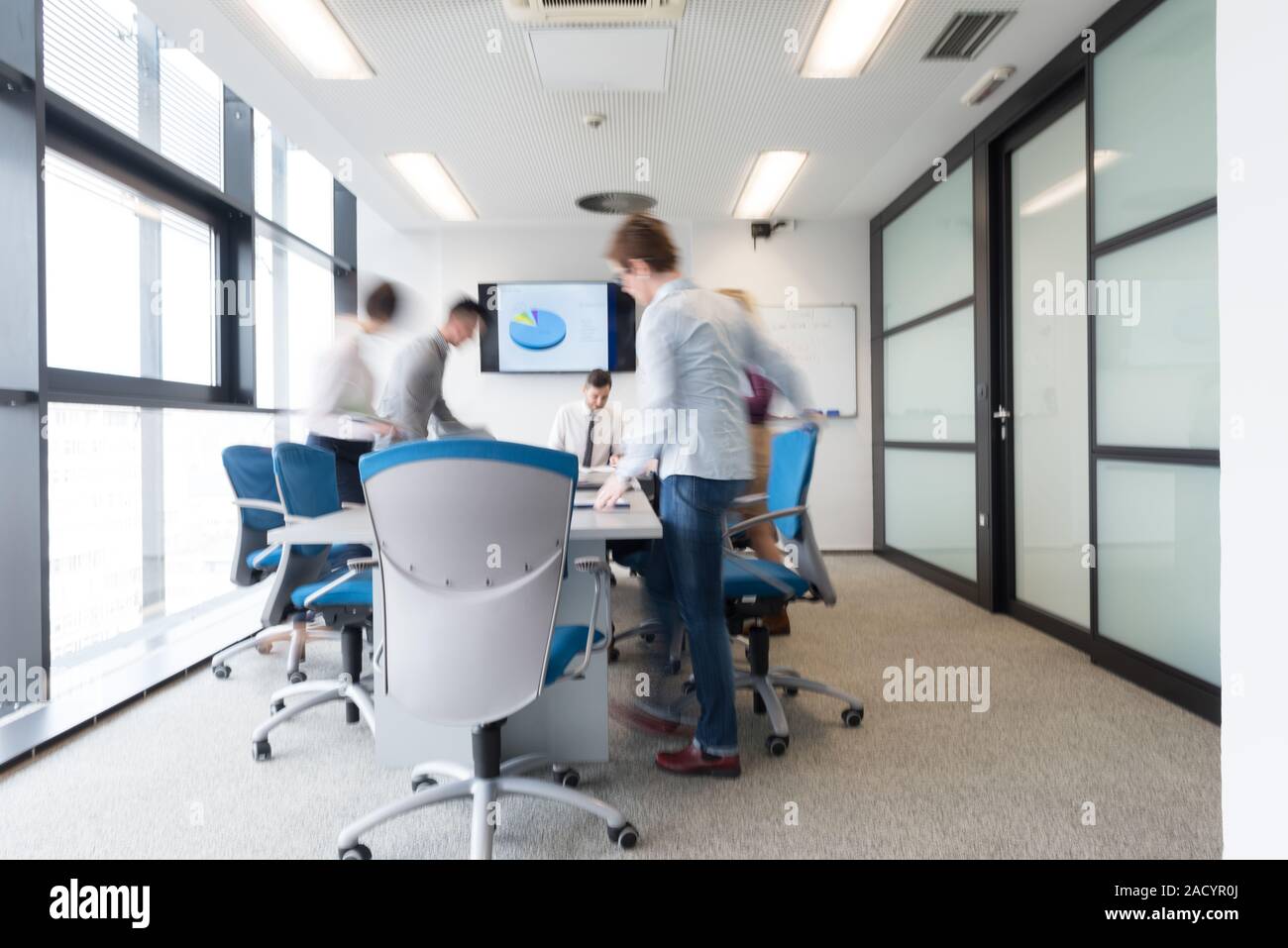 Group business people entering room hi-res stock photography and images ...