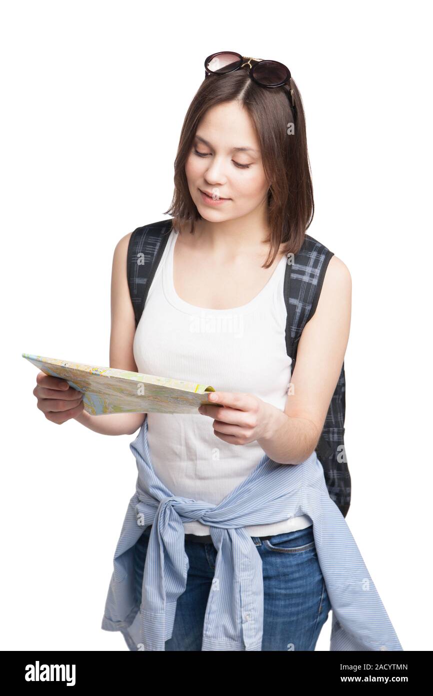 girl looking for place on map with rucksack Stock Photo - Alamy