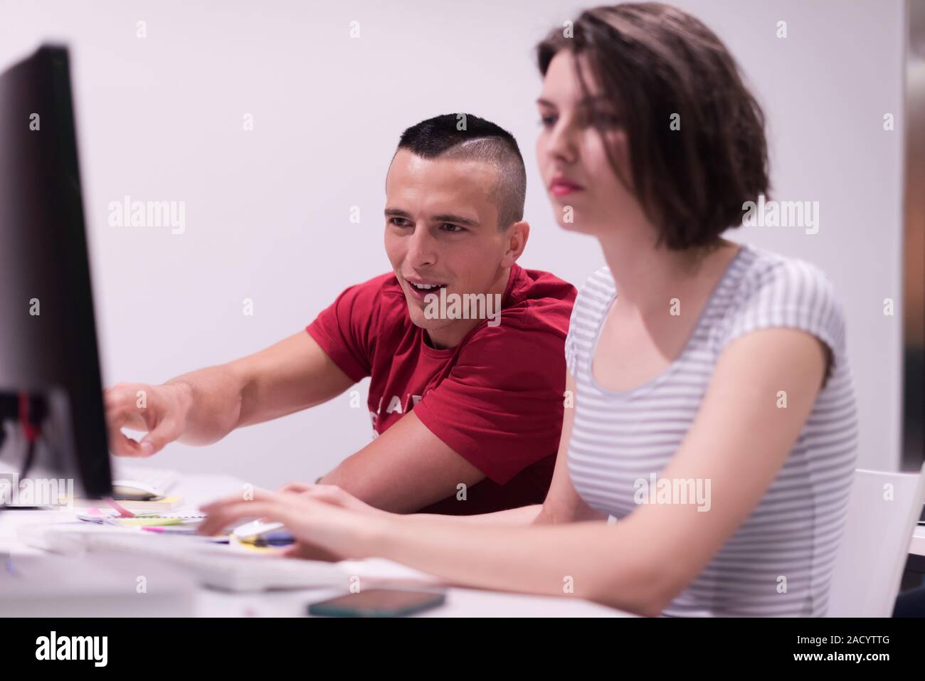 technology students group working in computer lab school classroom ...