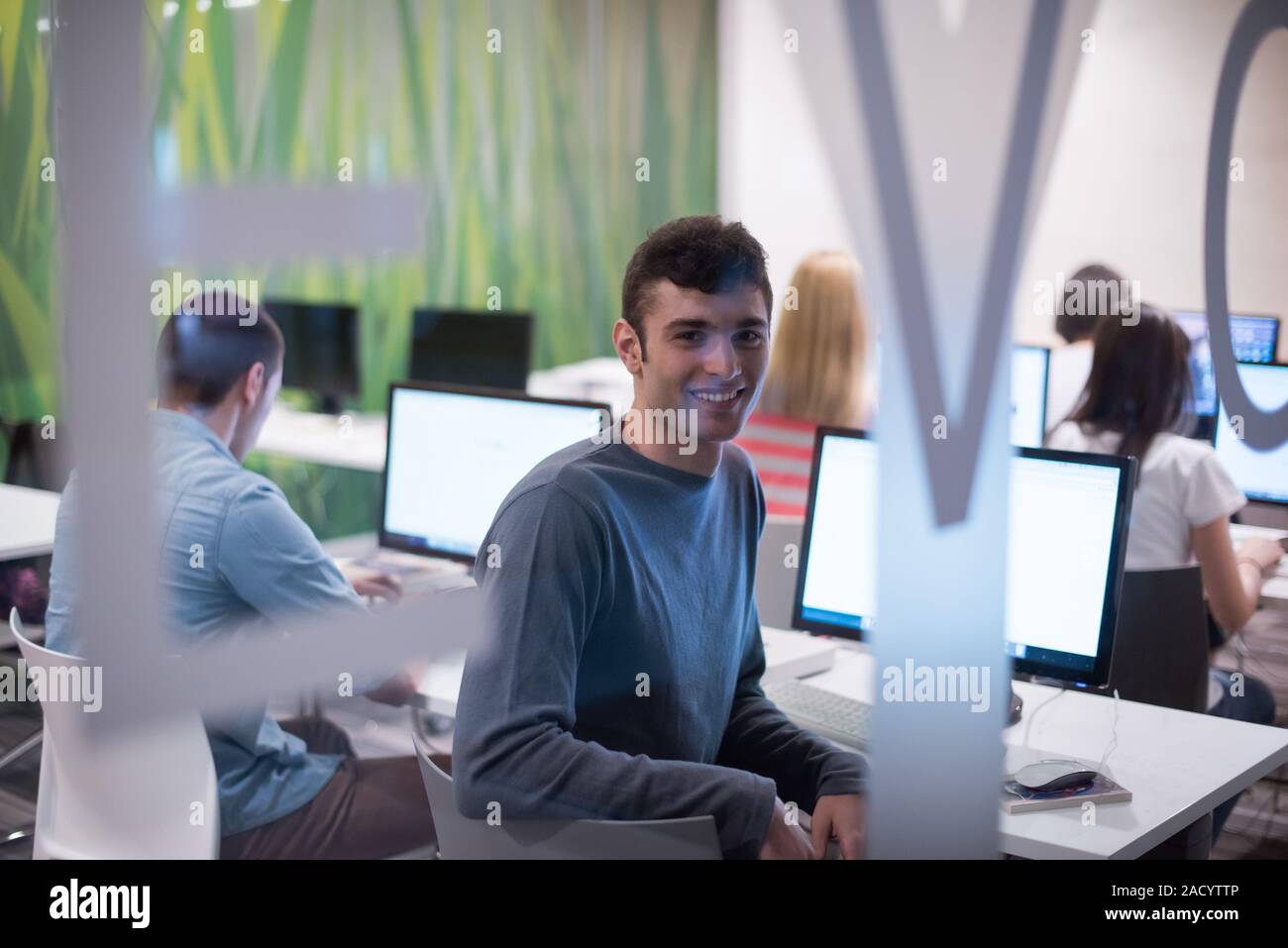 technology students group working in computer lab school classroom ...