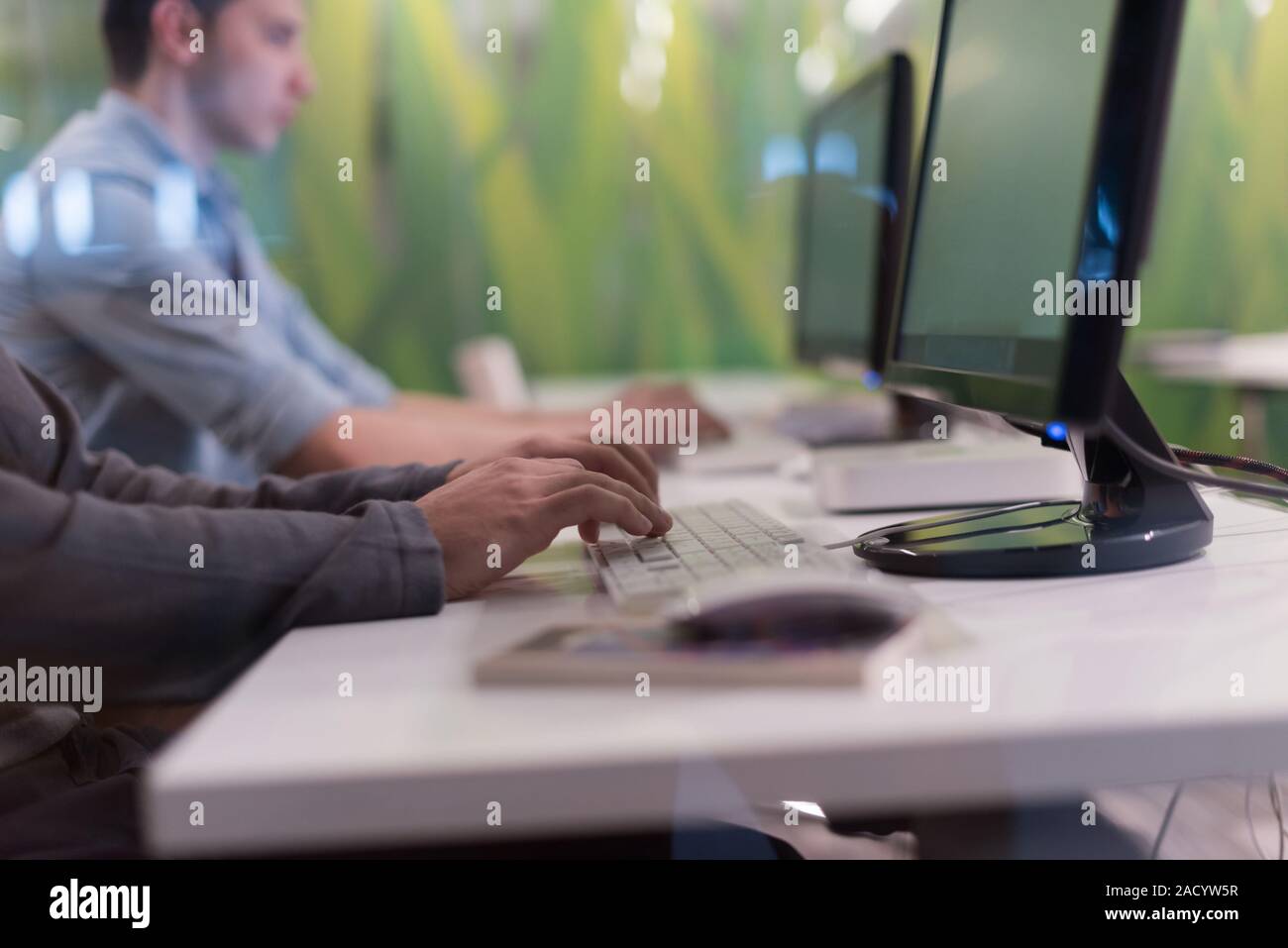 technology students group working in computer lab school classroom ...