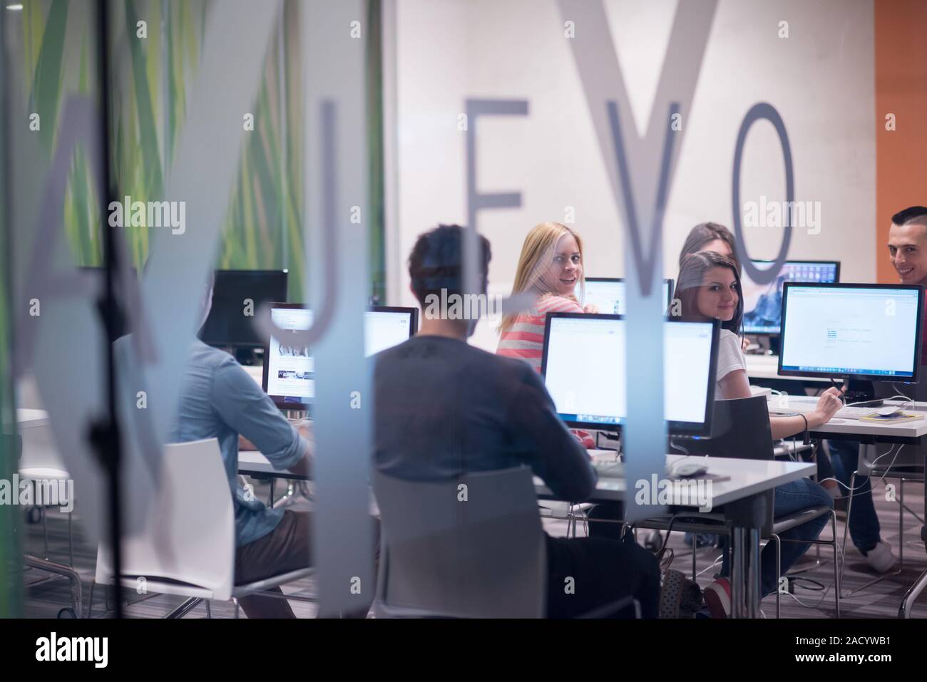 technology students group working in computer lab school classroom ...