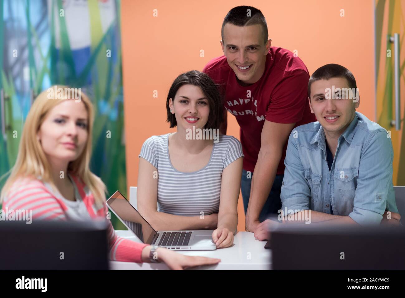 technology students group working in computer lab school classroom ...