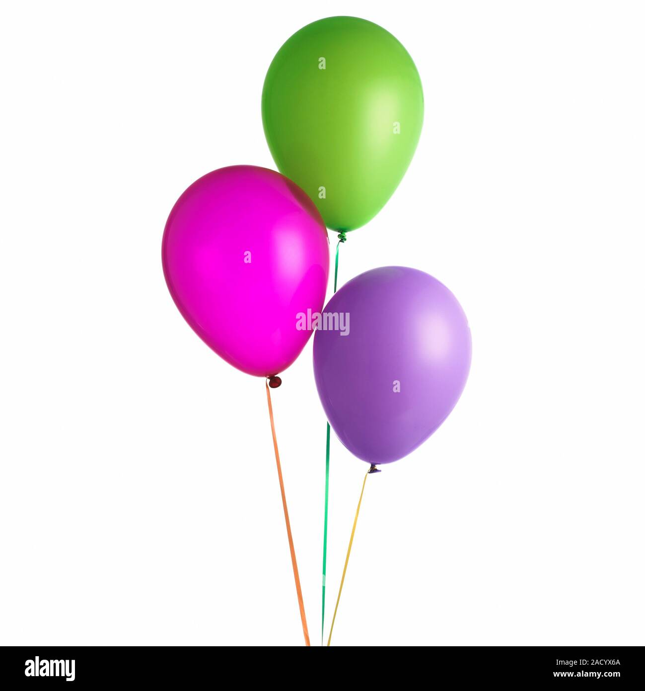 Coloured party balloons containing helium gas Stock Photo - Alamy