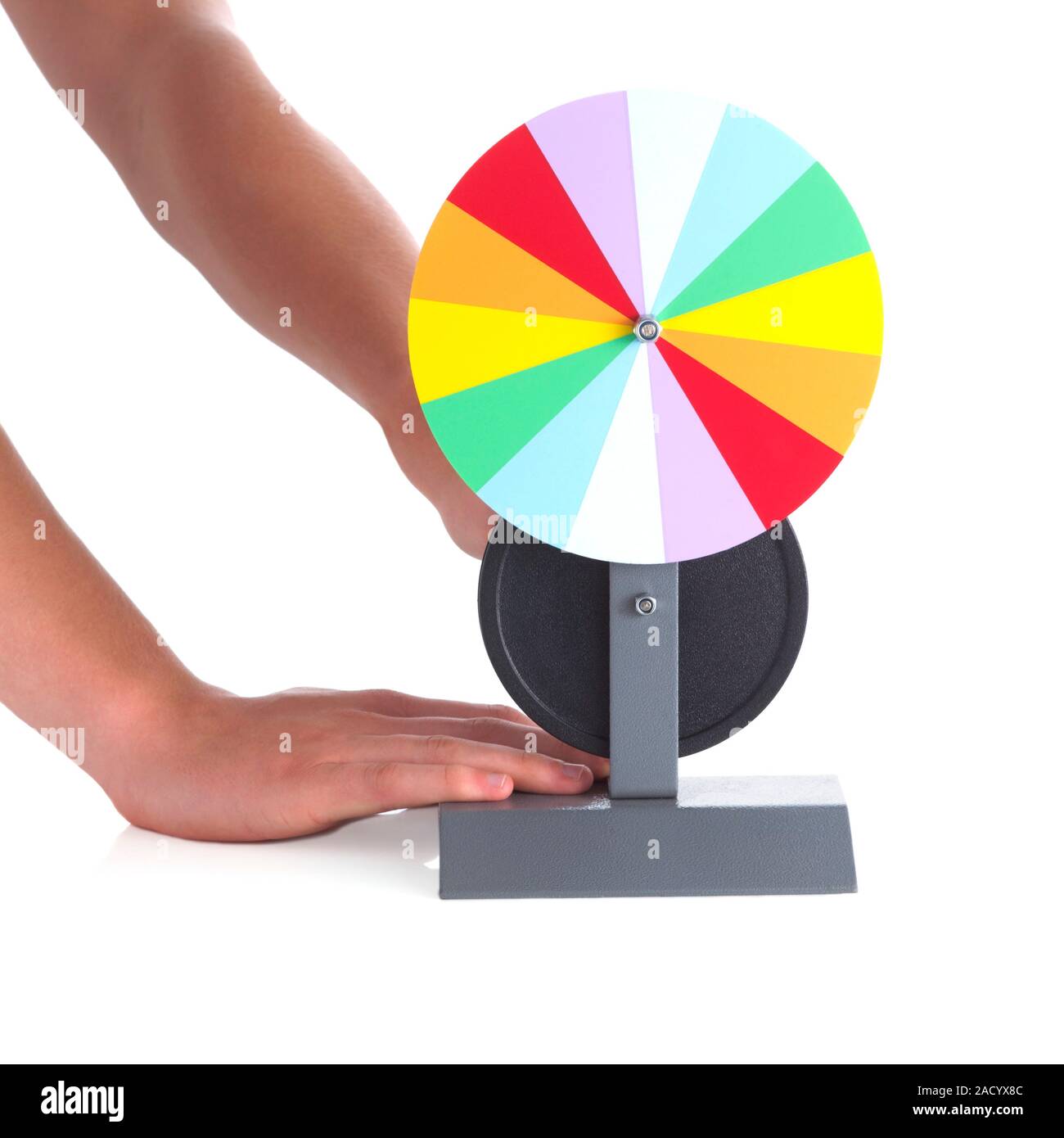 Newton's disc experiment. Newton's disc is a circular disc with ...