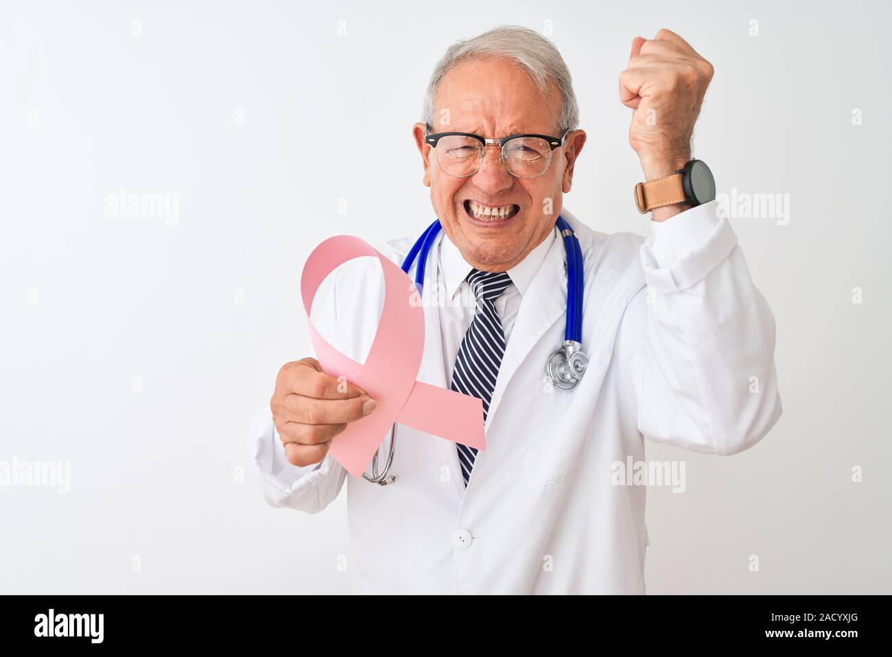 Senior grey-haired doctor man holding cancer ribbon over isolated white ...