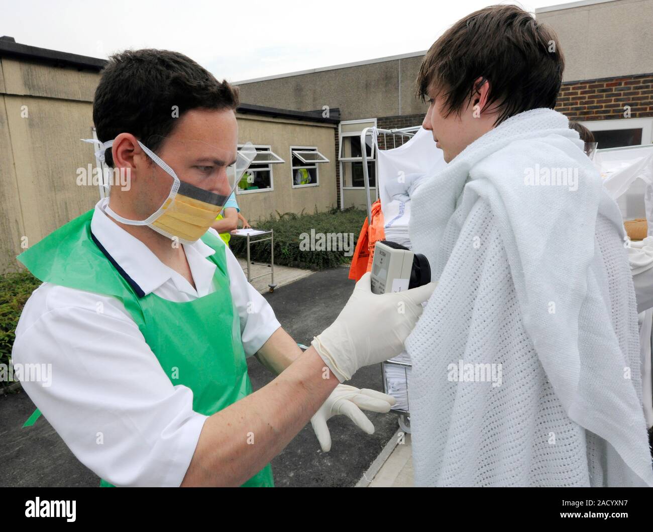 Radiation emergency response monitoring. Emergency worker using a ...