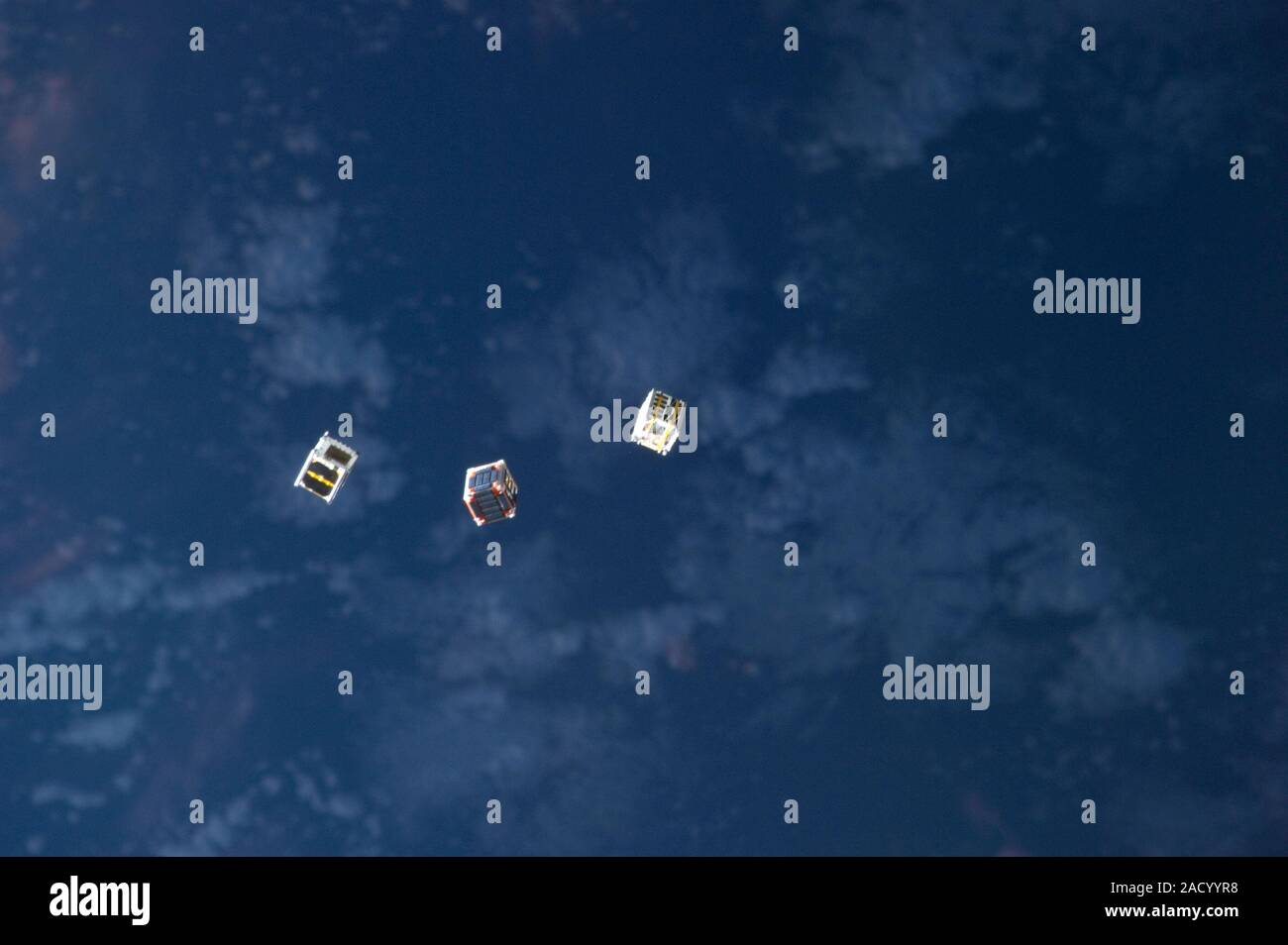 Satellites from the ISS. Astronaut photograph of several tiny ...