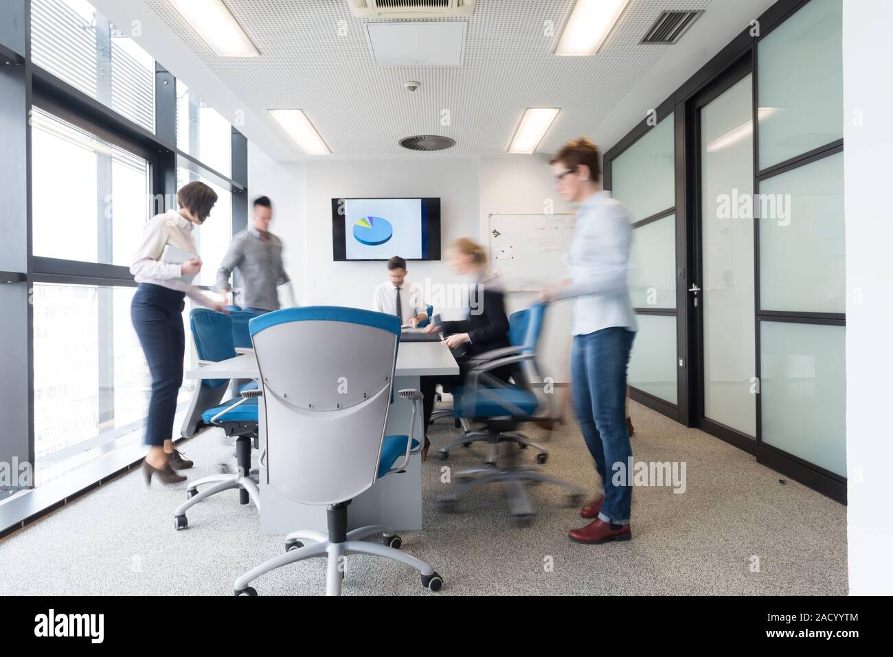 Group business people entering room hi-res stock photography and images ...