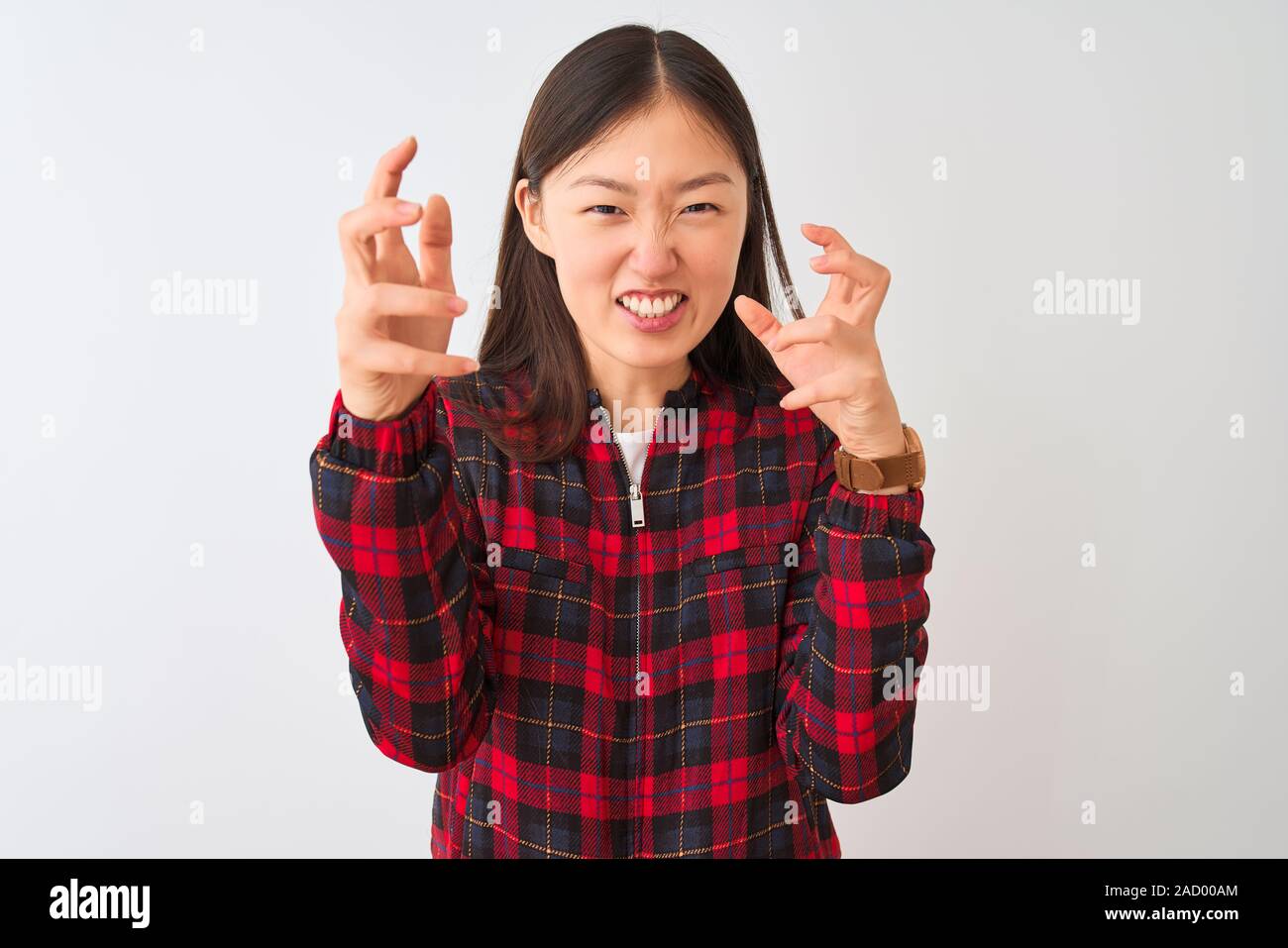 Young chinese woman wearing casual jacket standing over isolated white ...